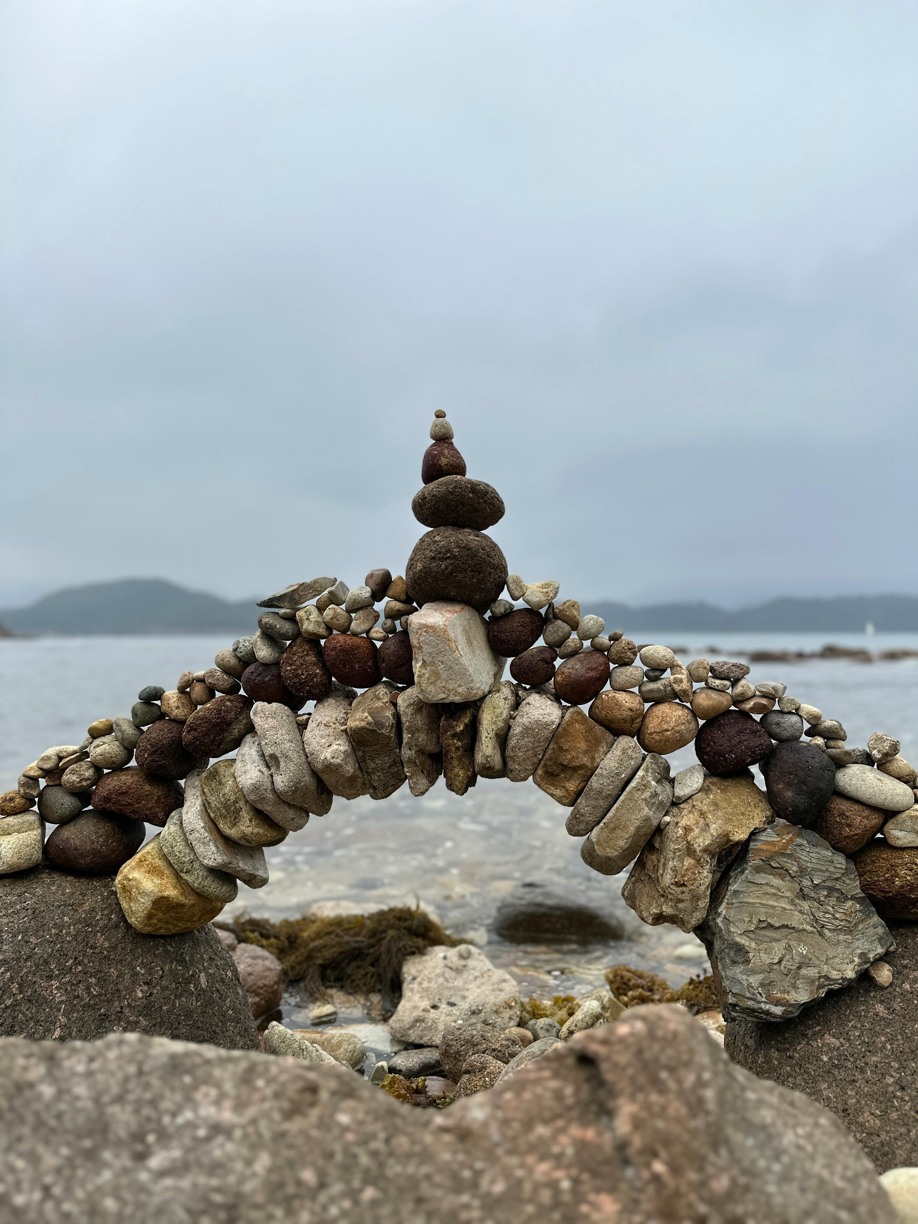 Arch of Stones near Water · Free Stock Photo