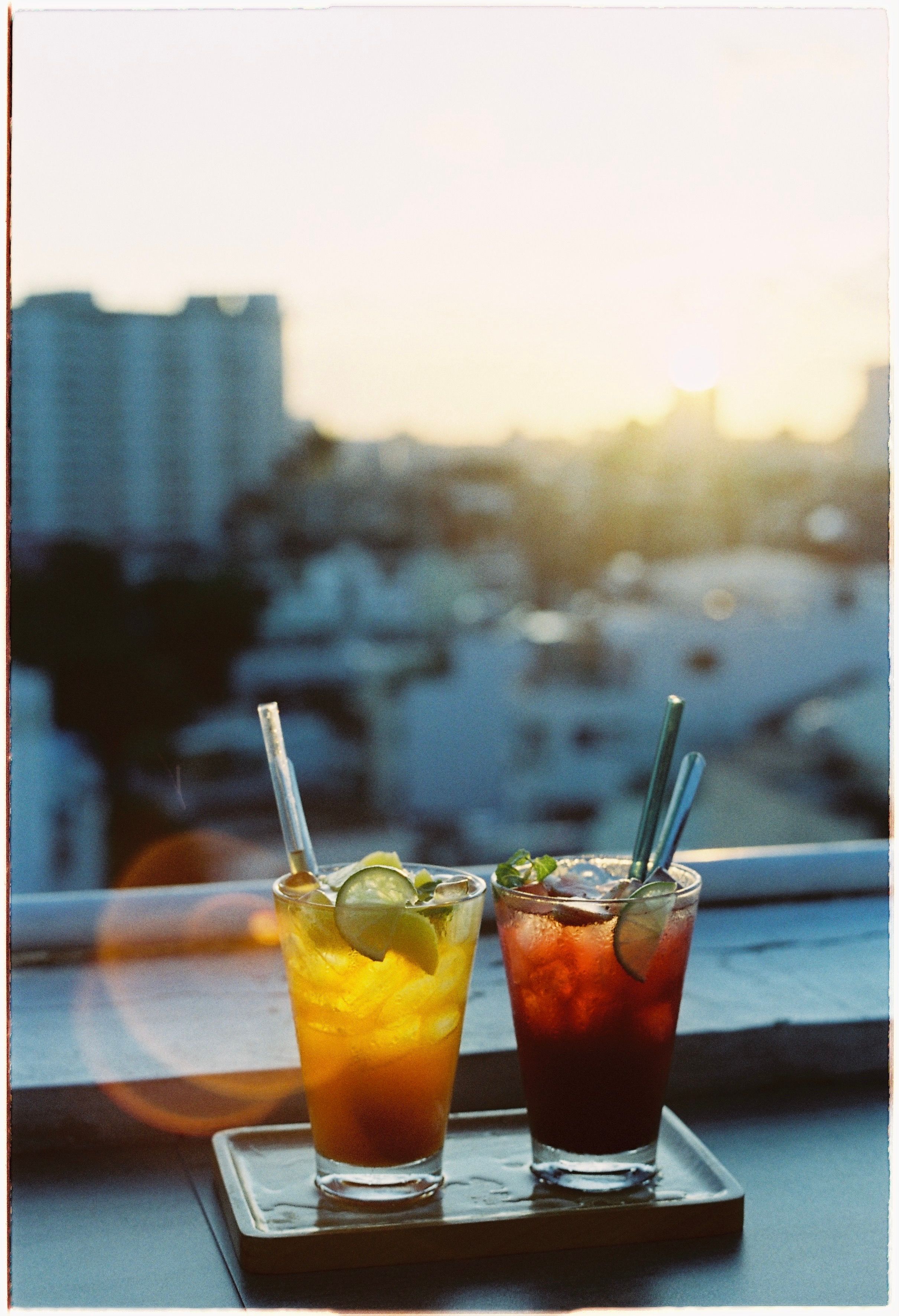 Cold Drinks in Glasses on Sunset · Free Stock Photo