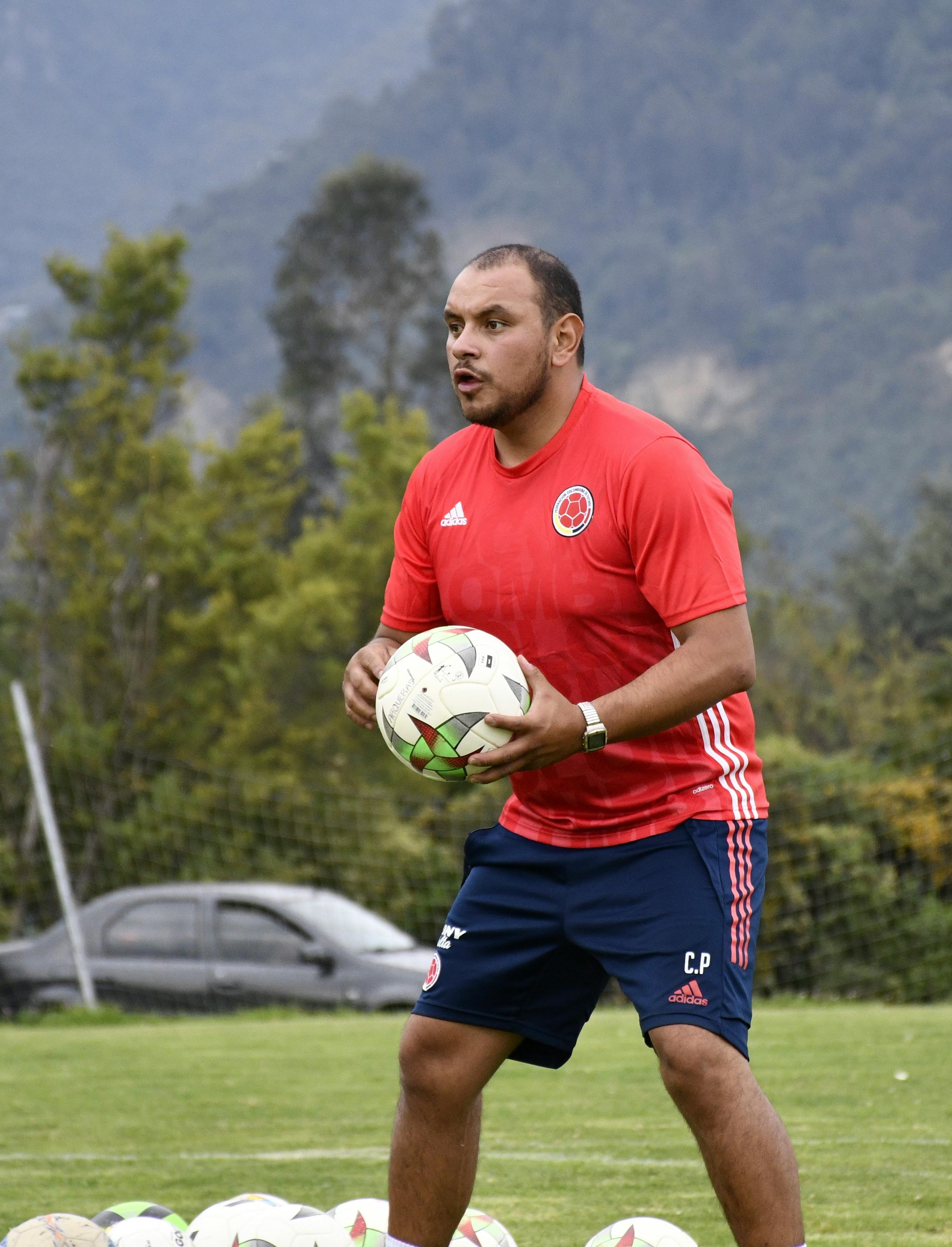 Man Standing with Football Ball · Free Stock Photo