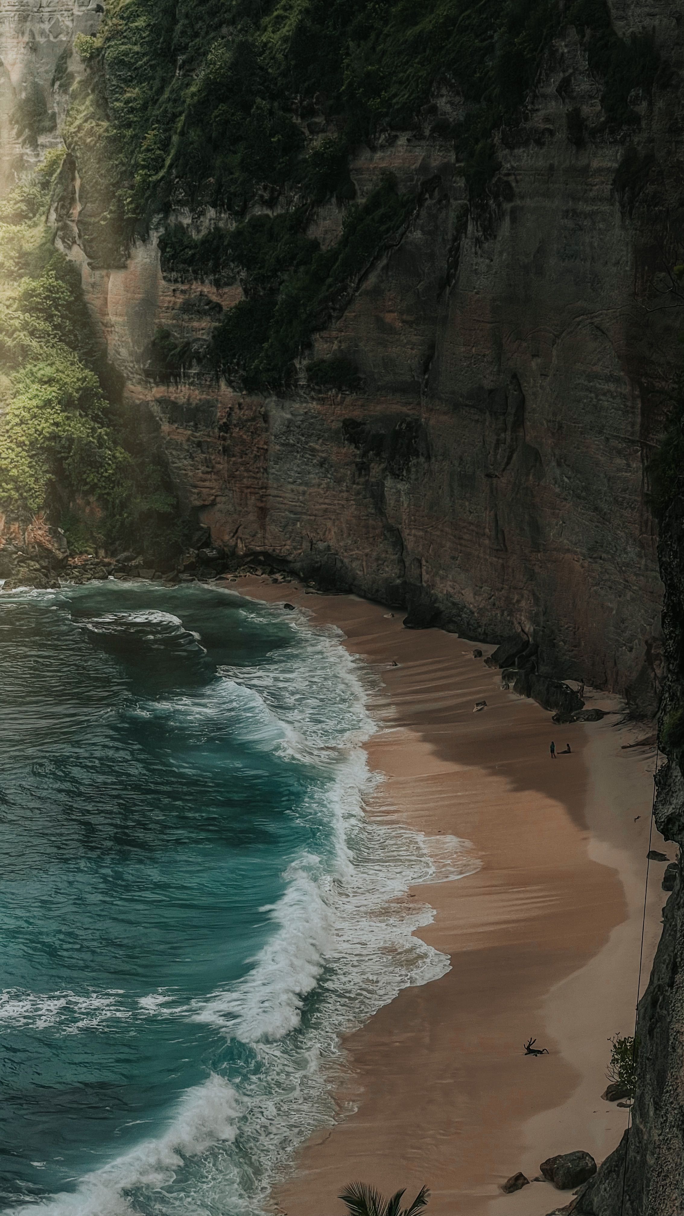 Beach Surrounded by a High Cliff · Free Stock Photo