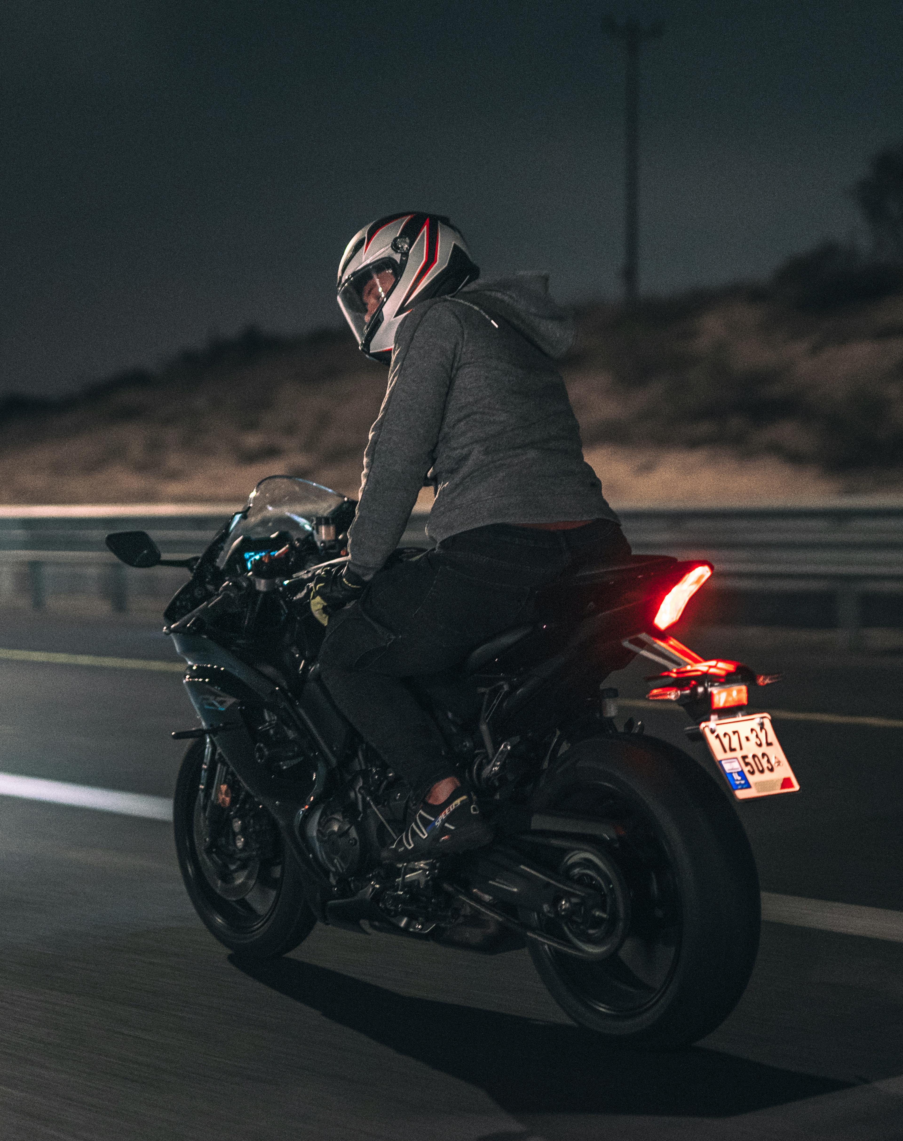 Man Riding on a Motorcycle at Night · Free Stock Photo