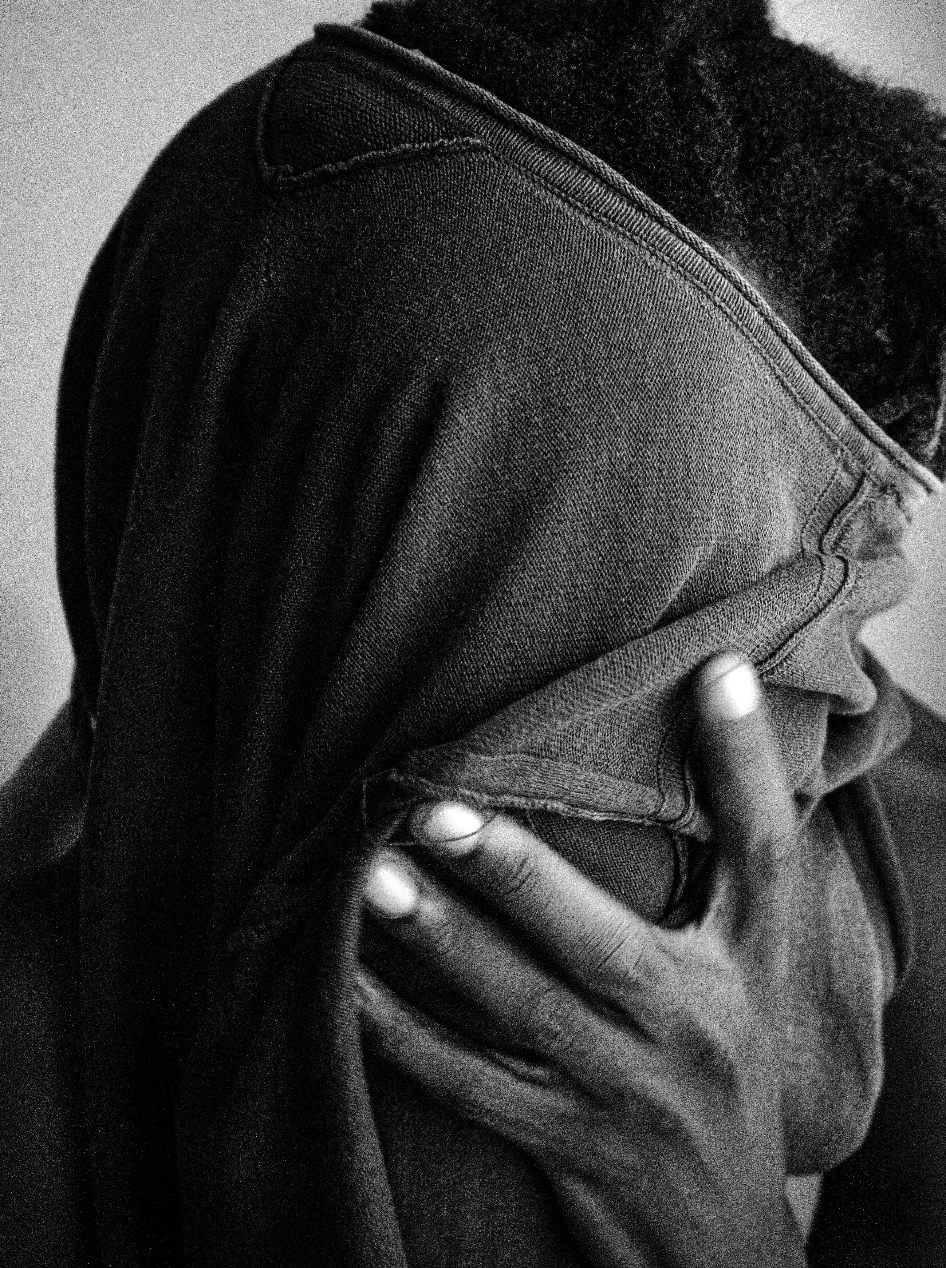 Grayscale Photo of Man With Hand on Face · Free Stock Photo