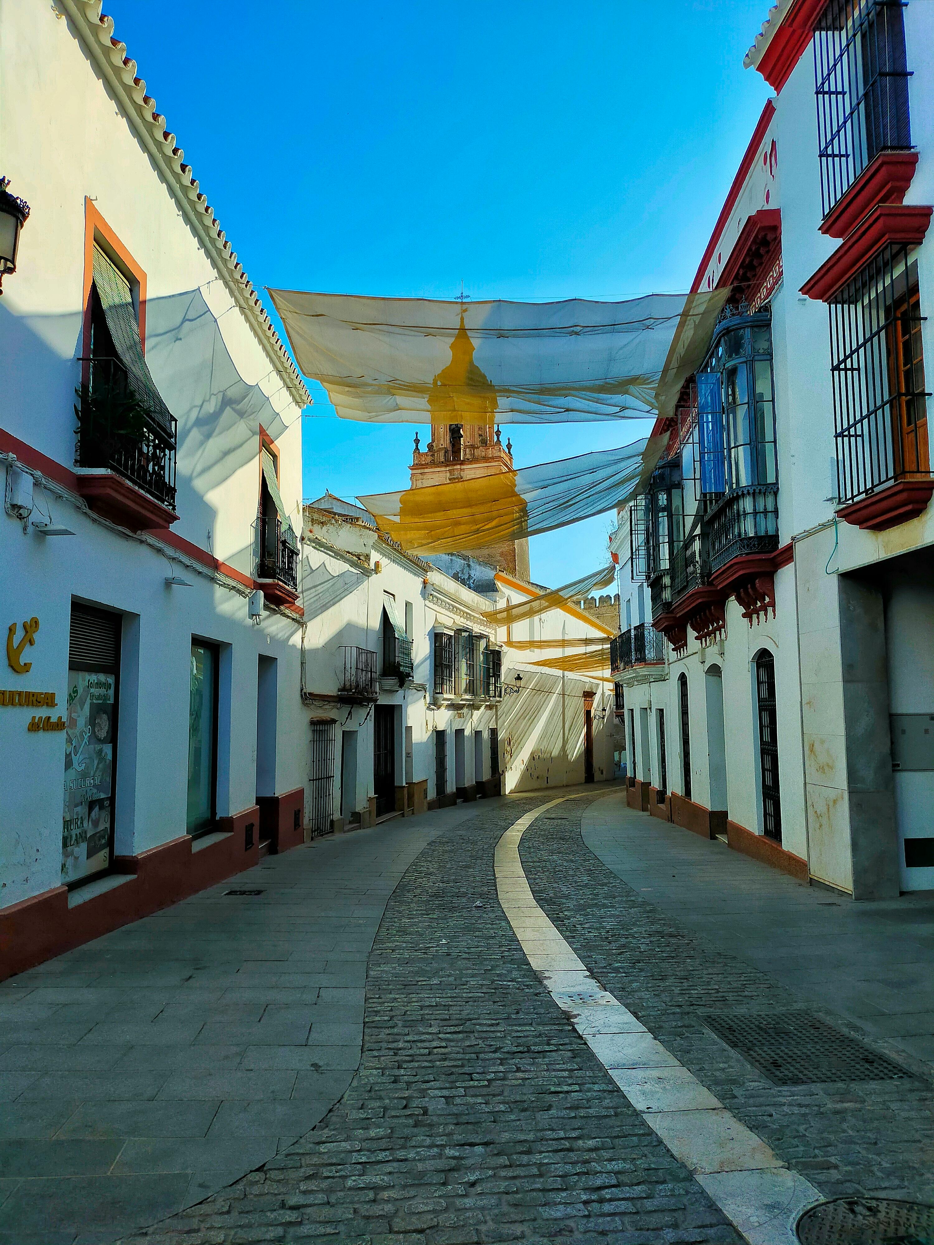 Fabric Hanged above Narrow Street in Medina, Spain · Free Stock Photo