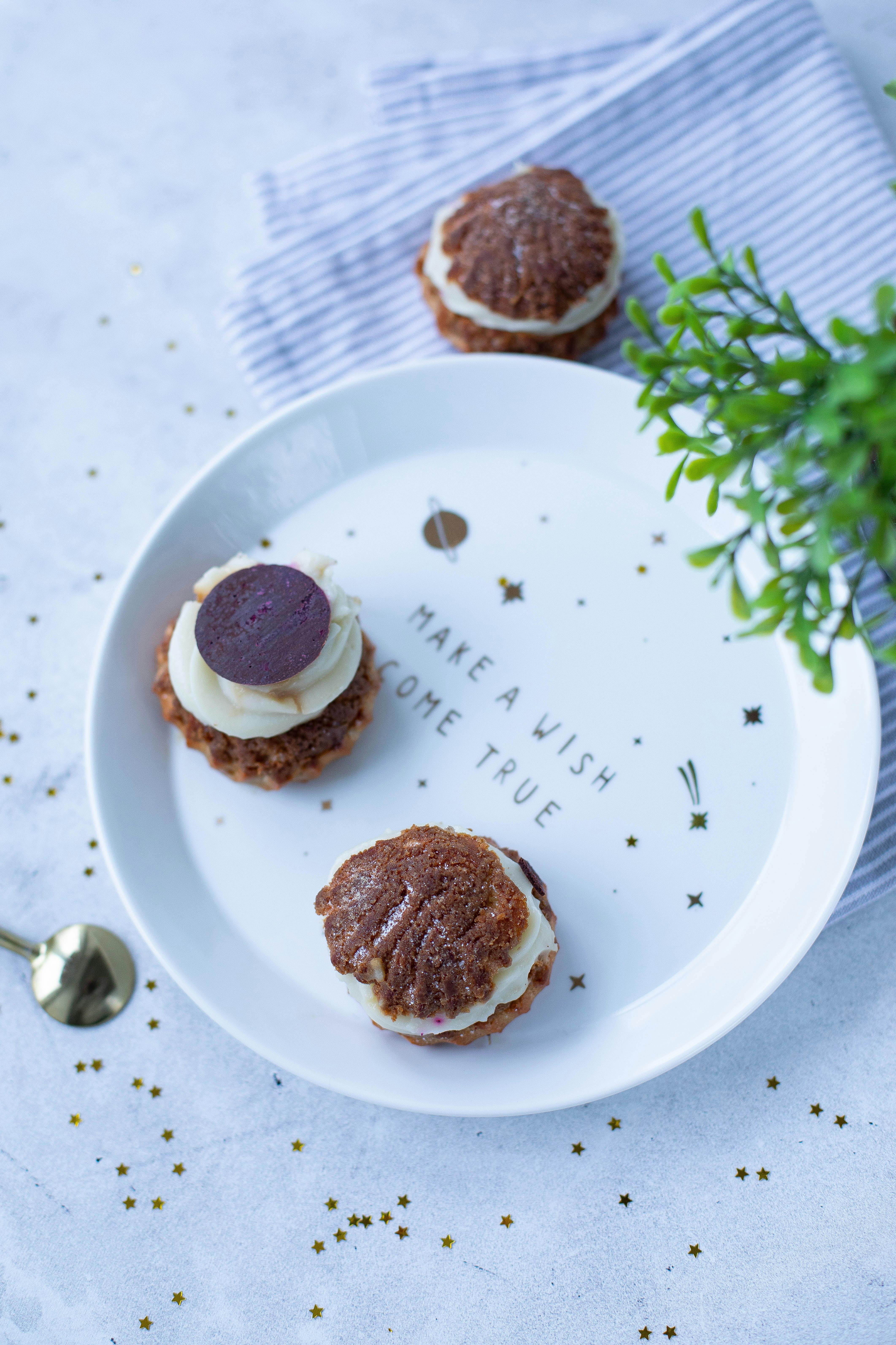 Puffy Cream Pastries Served on White Plate · Free Stock Photo