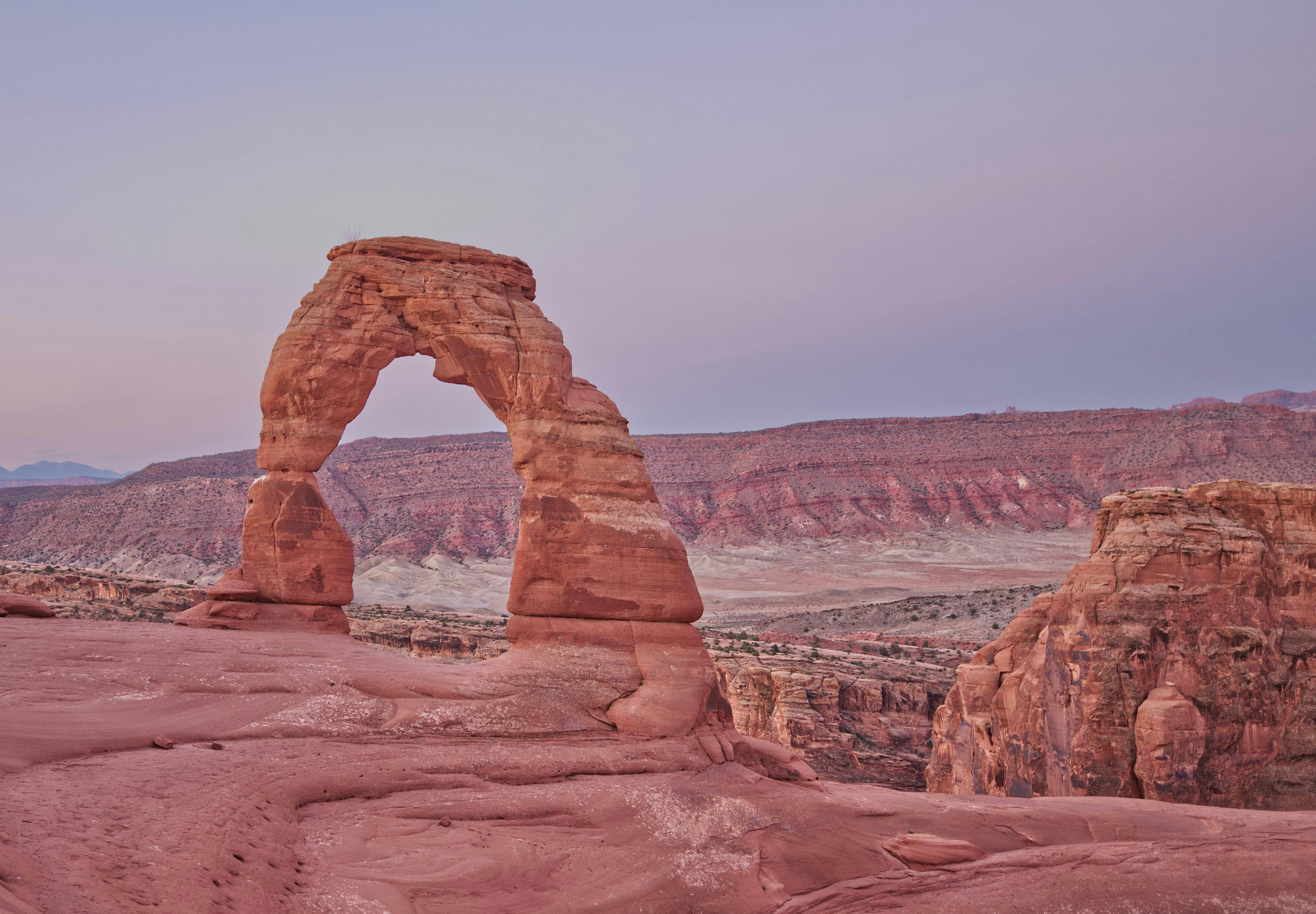 Delicate Arch and Rock Formation in Utah · Free Stock Photo