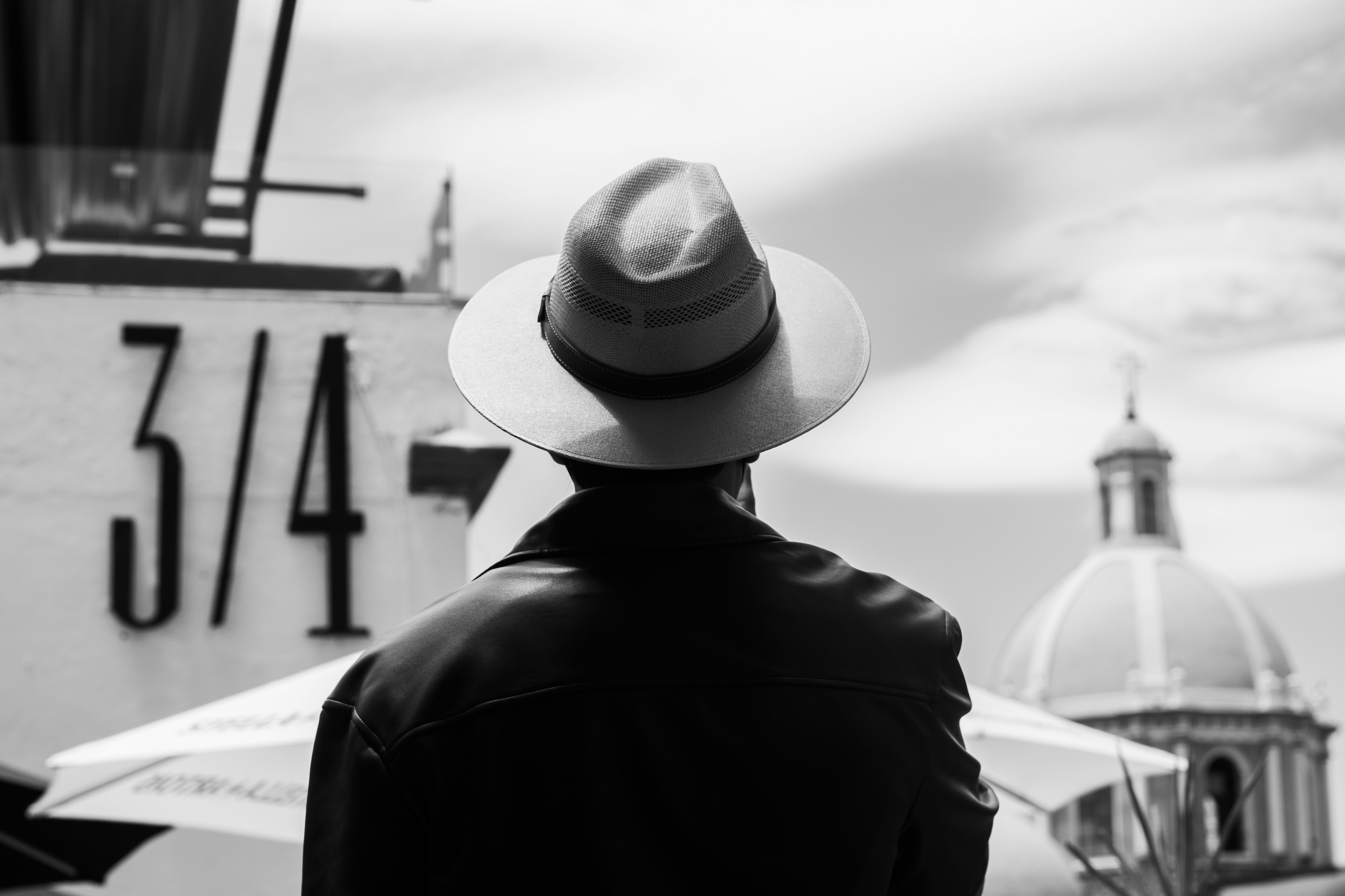 Man in Hat and Coat at Night · Free Stock Photo