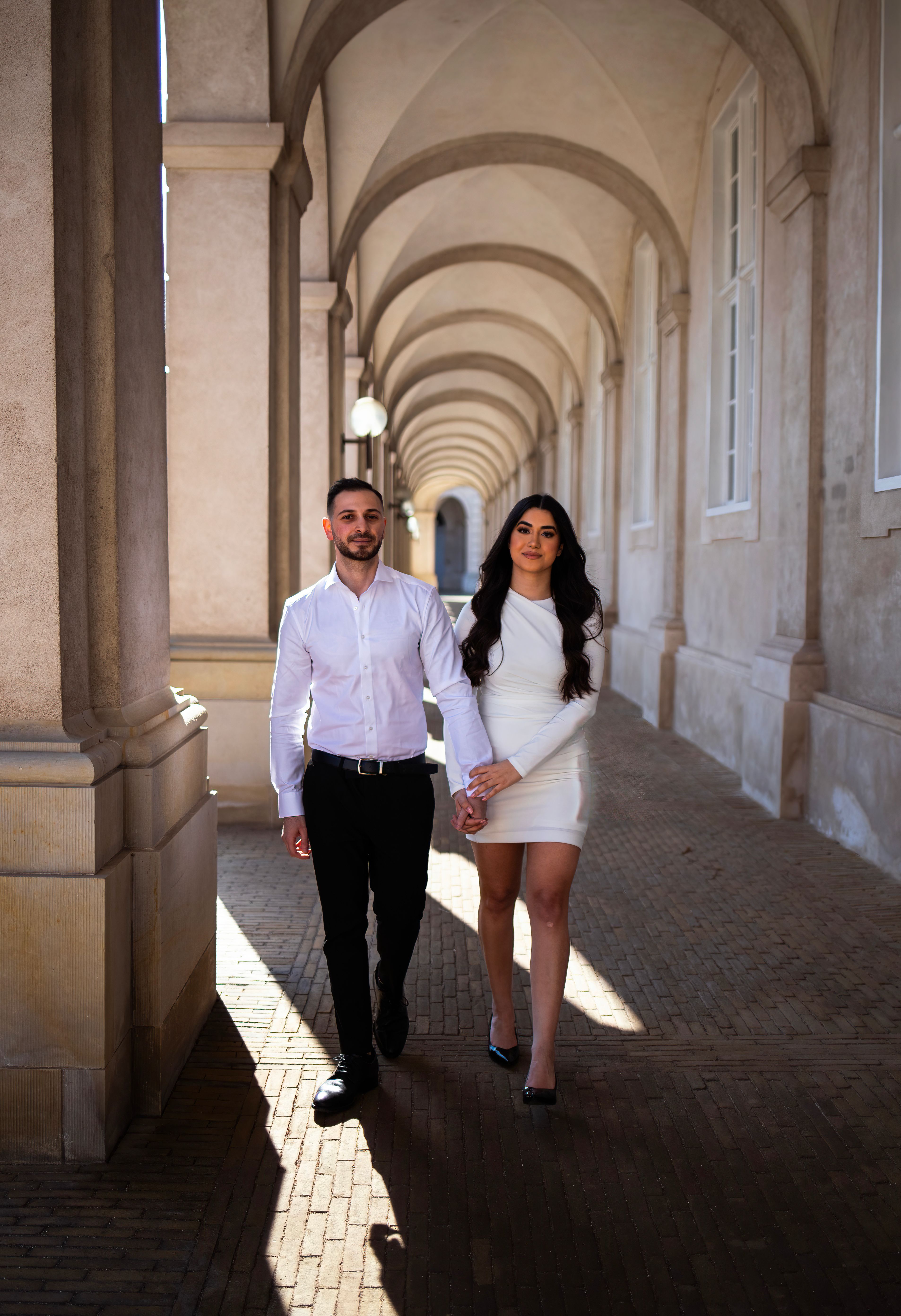 Woman and Man Holding Hands and Walking Together · Free Stock Photo