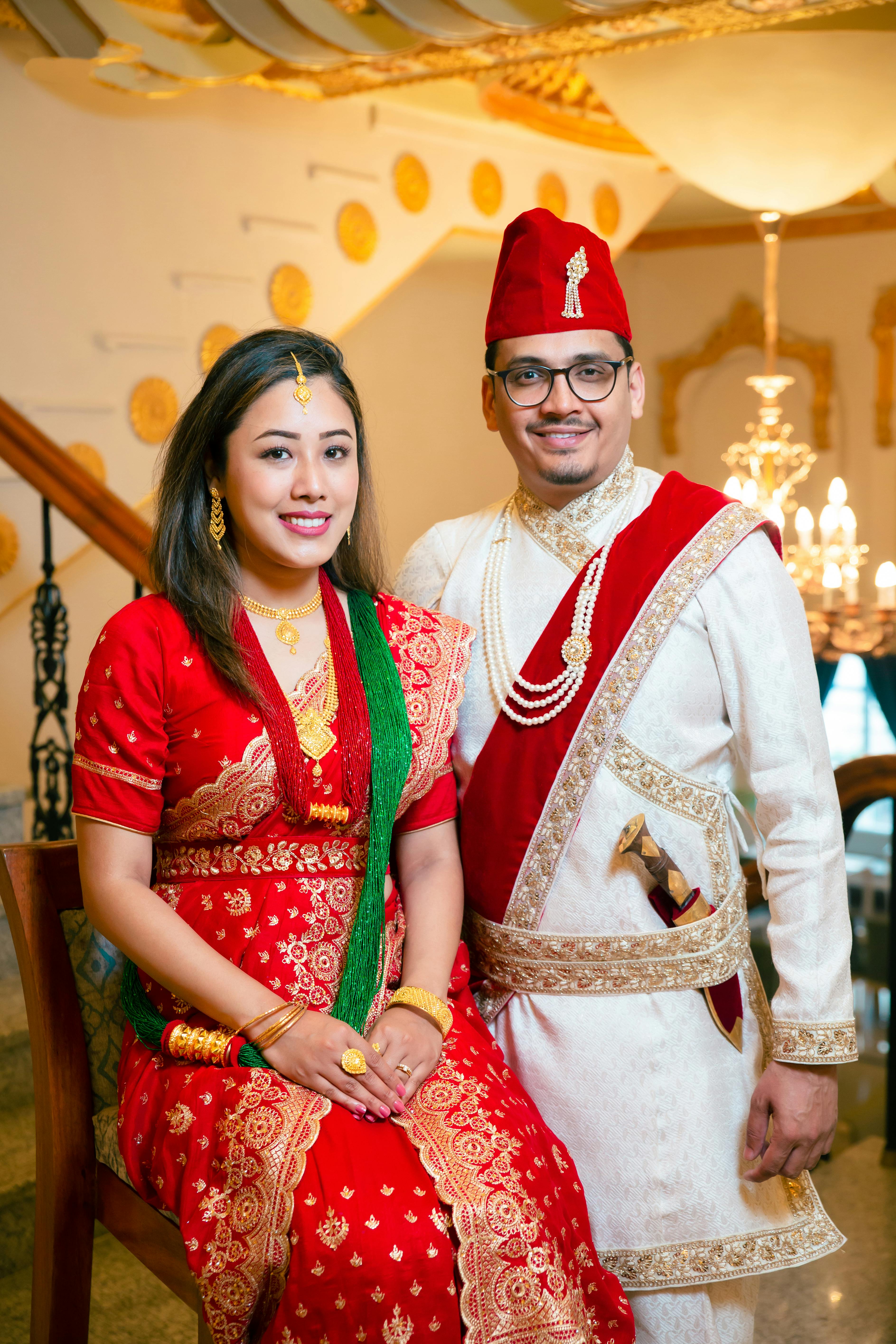 Couple in Traditional Clothing · Free Stock Photo