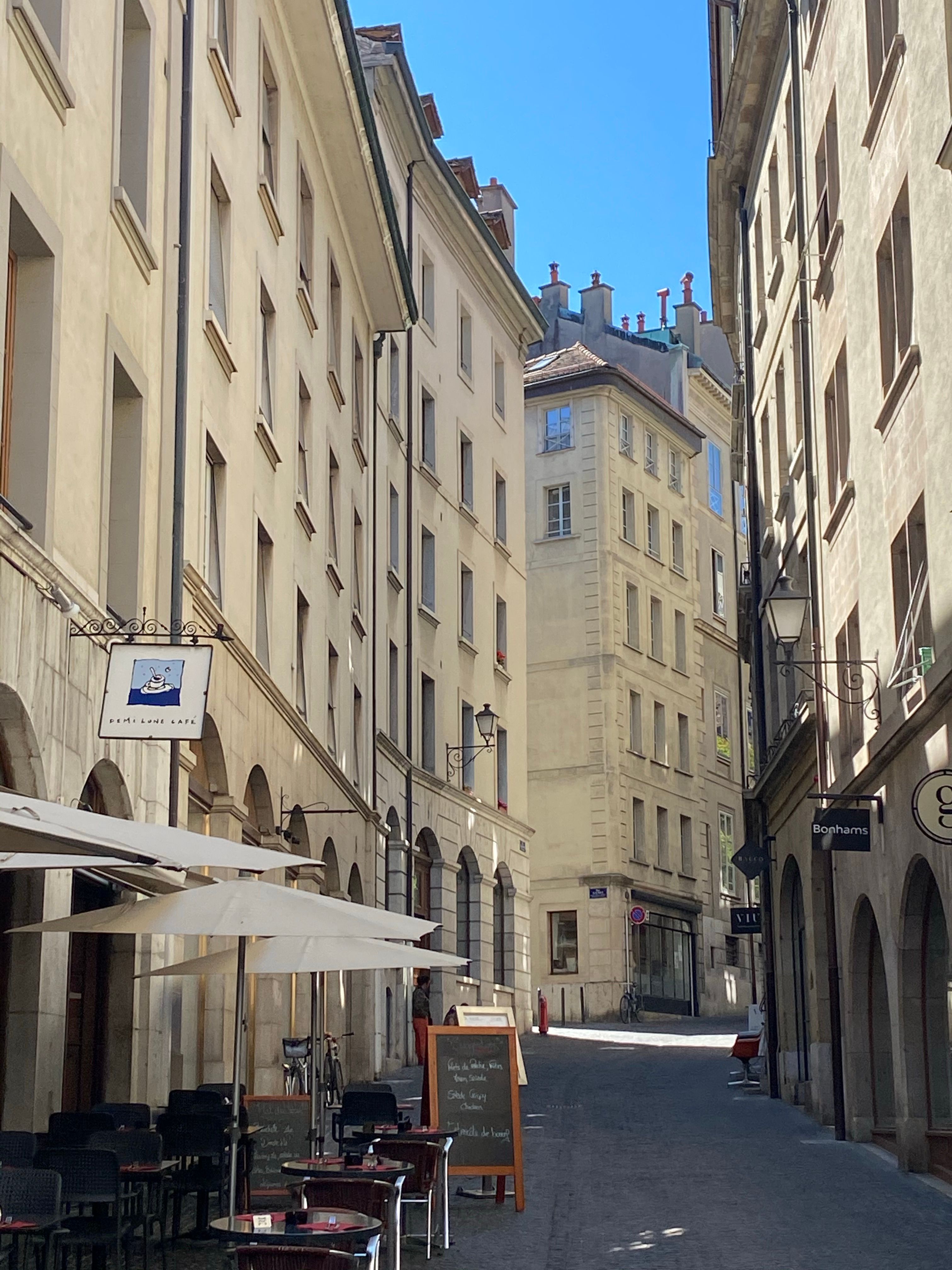 Buildings around Empty Street in Town · Free Stock Photo