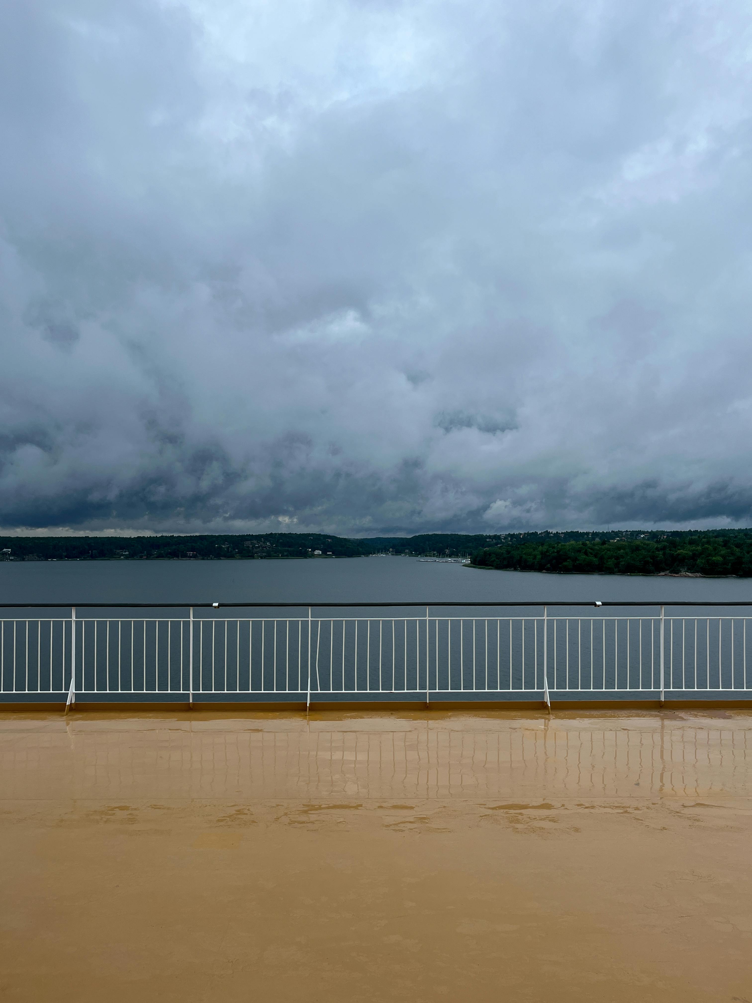 Rain Clouds over Lake Seen from Boat · Free Stock Photo
