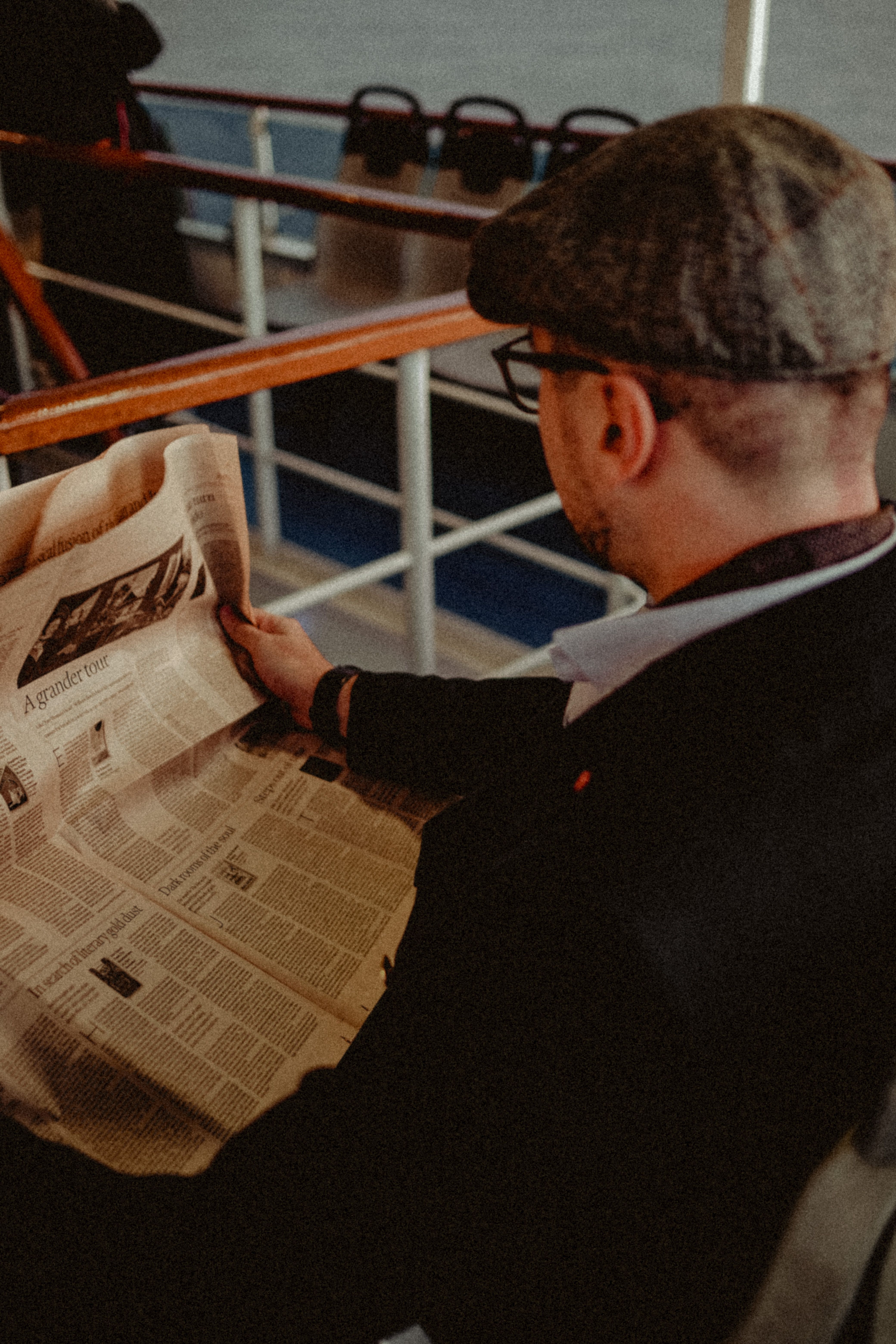 A Man Reading a Notebook · Free Stock Photo