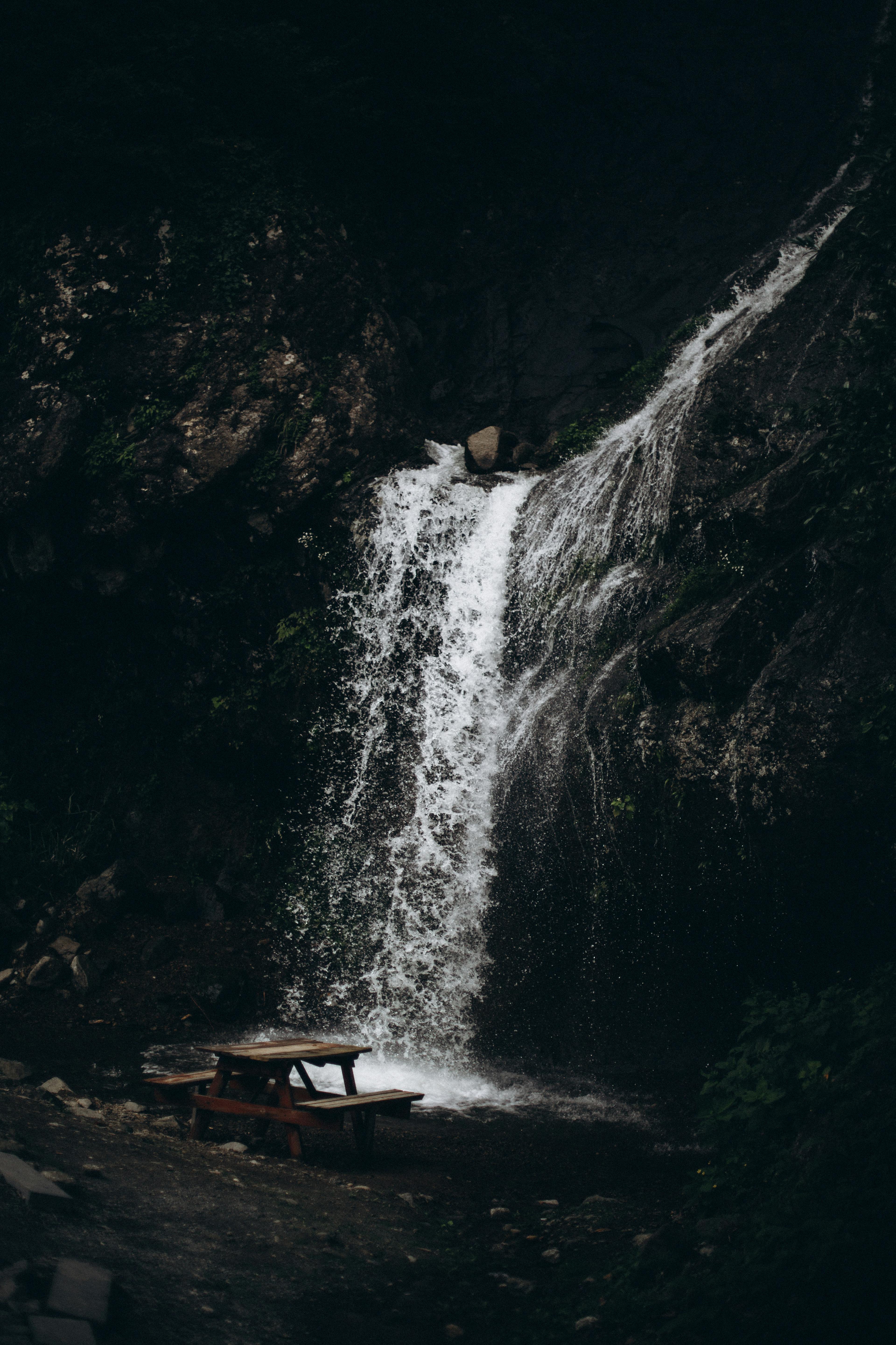 Picnic Table by Waterfall · Free Stock Photo