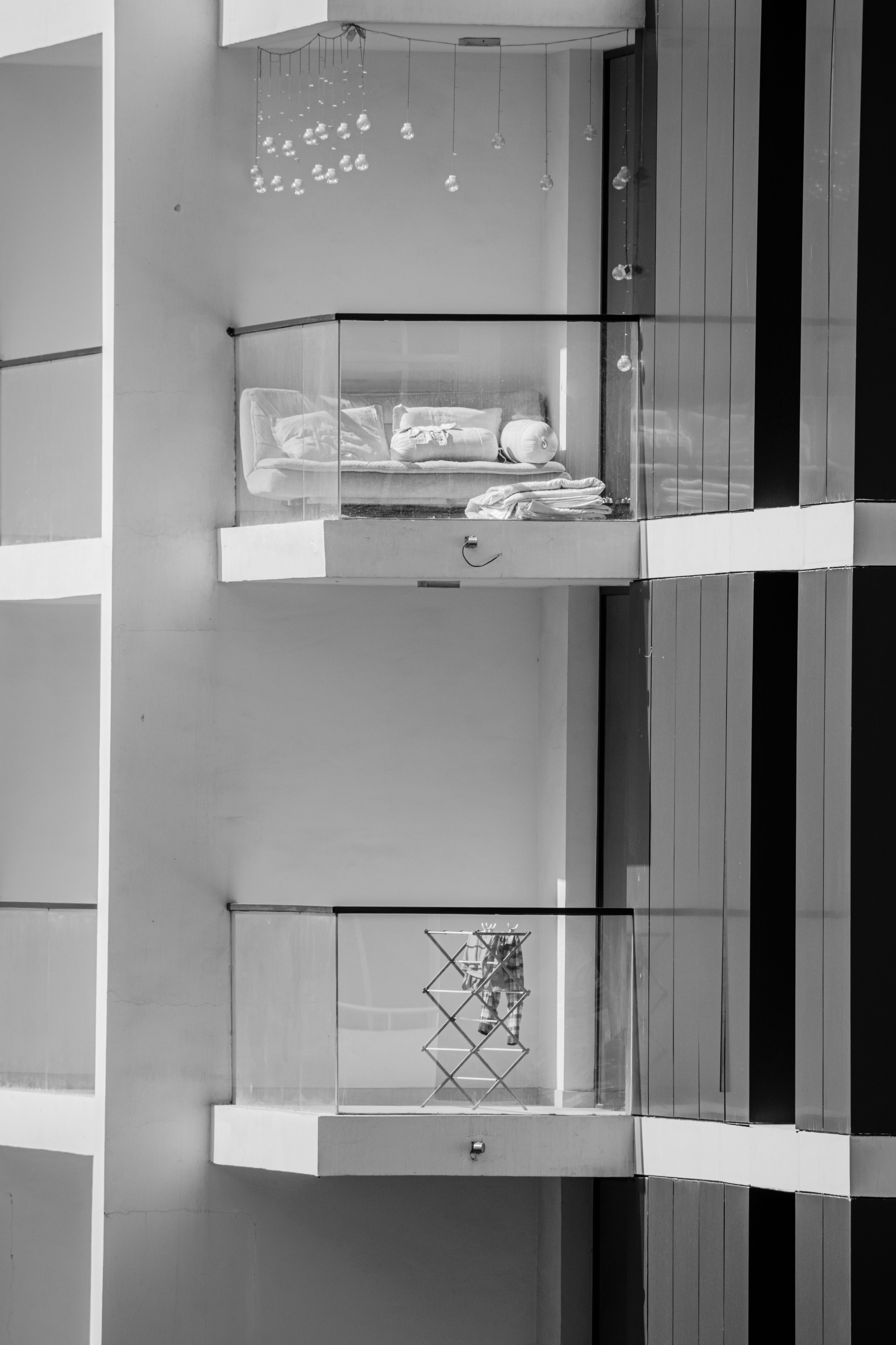 Close-up Photo of Glass Pumps on a Shelf · Free Stock Photo