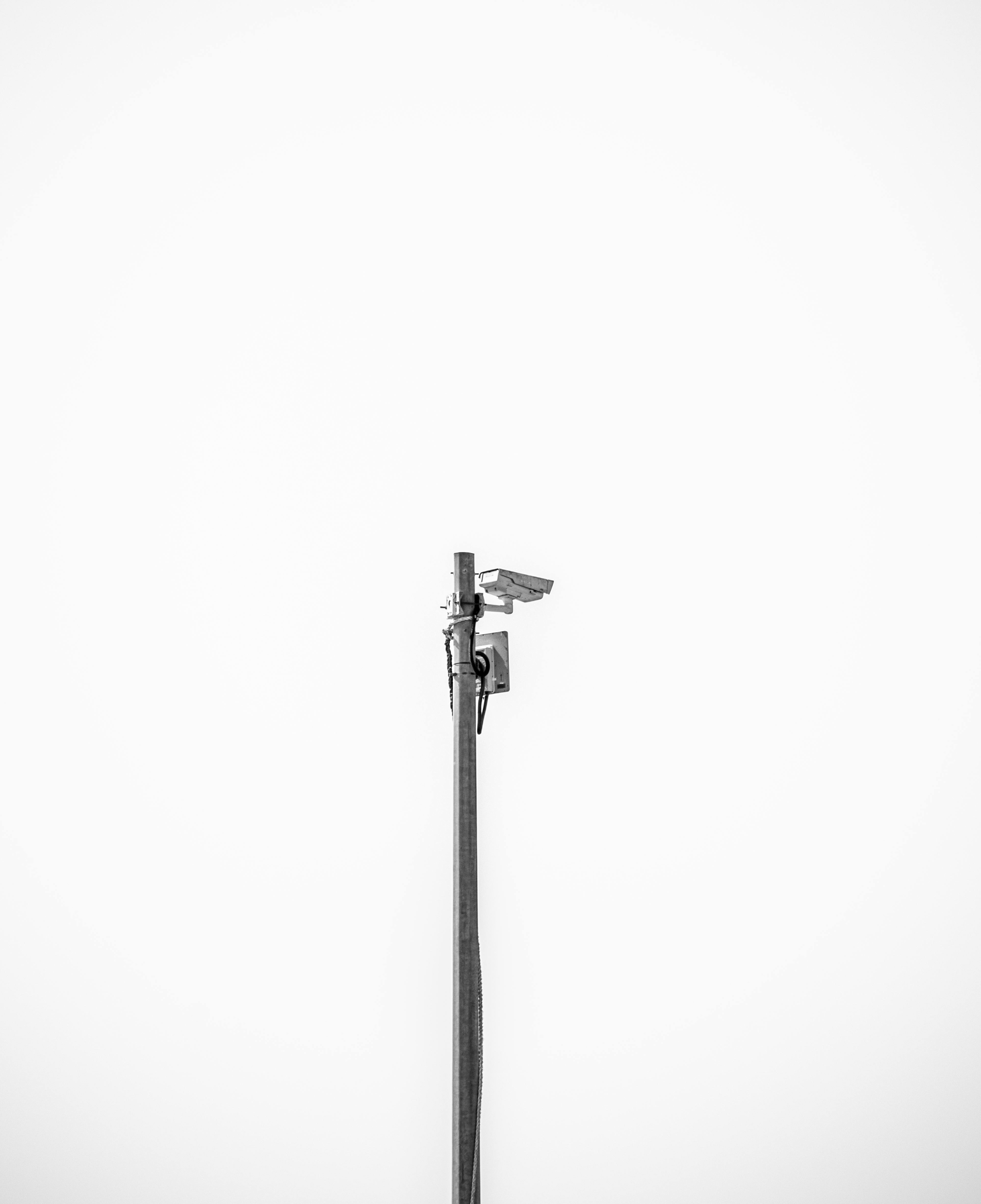 Two Gray Bullet Security Cameras · Free Stock Photo