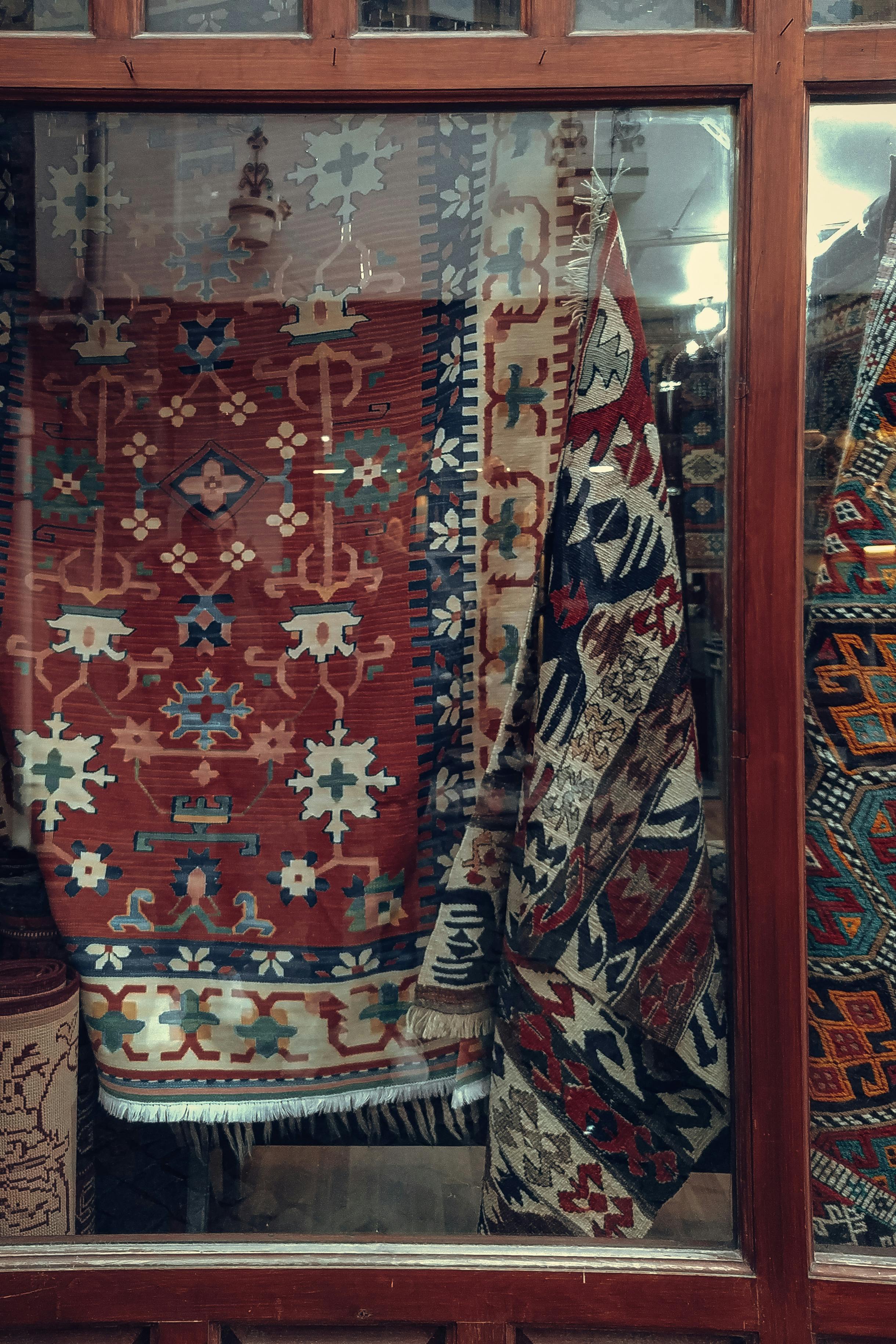 An Antique Carpet on an Exhibition · Free Stock Photo