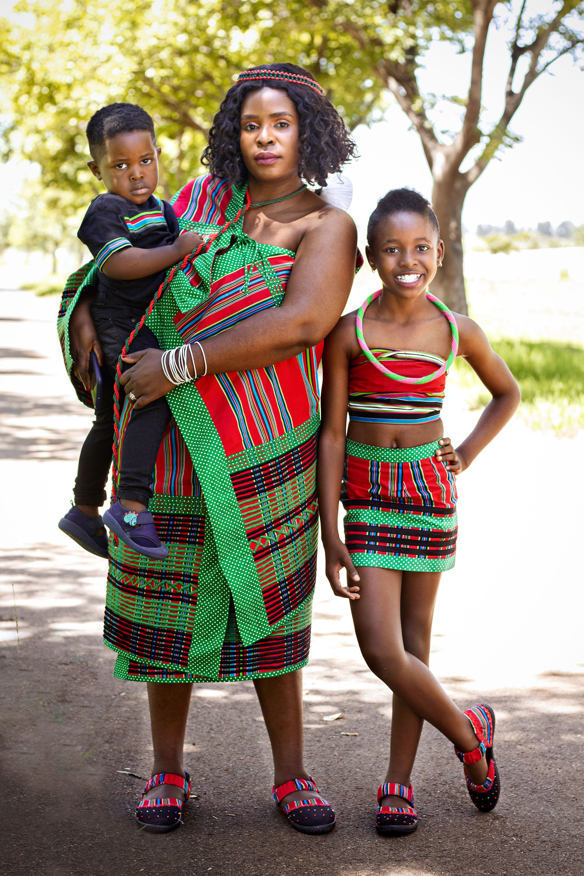 Mother Posing with Her Son and Daughter All Wearing Traditional ...