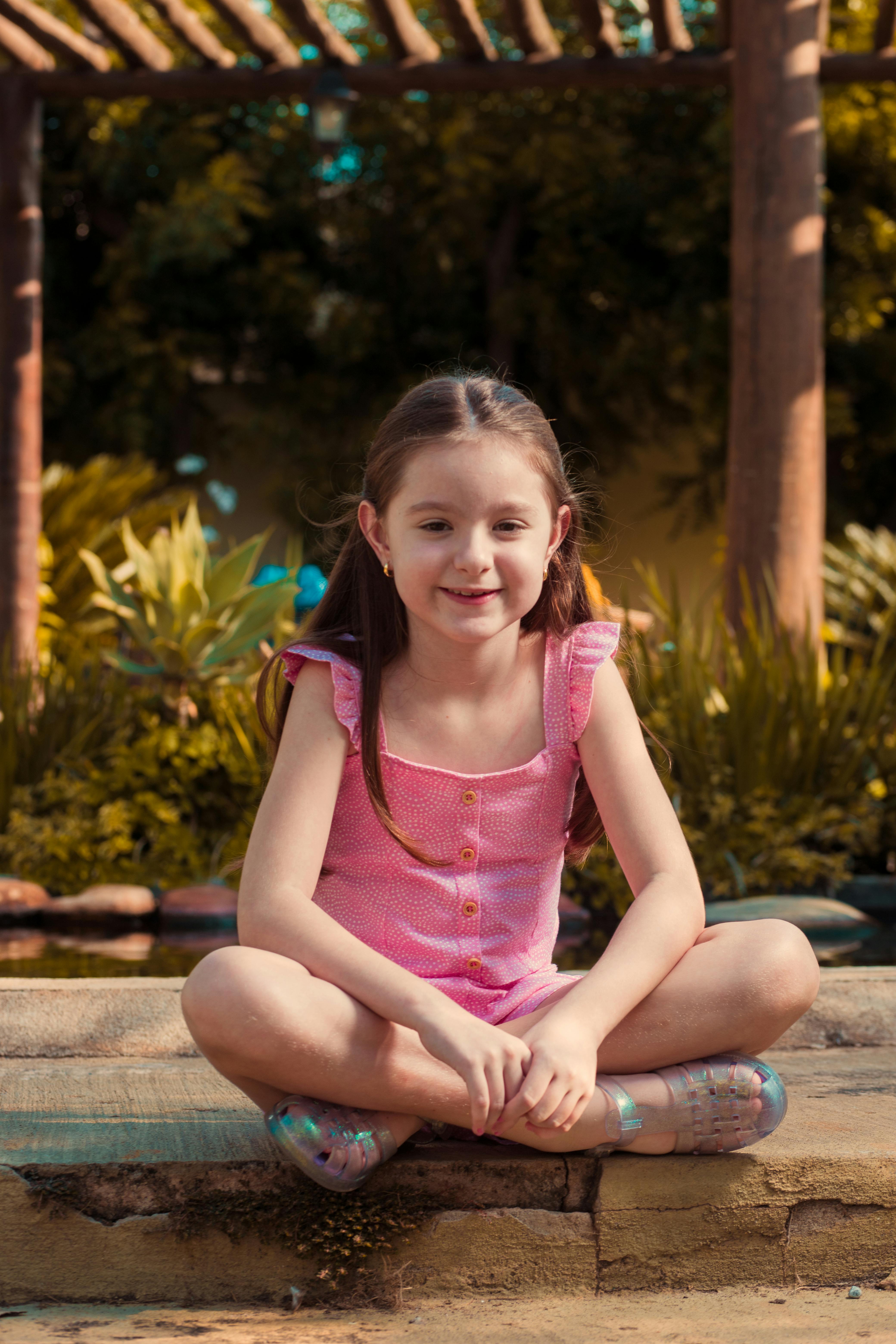 Little Girl in Pink Wellies and Yellow Raincoat · Free Stock Photo