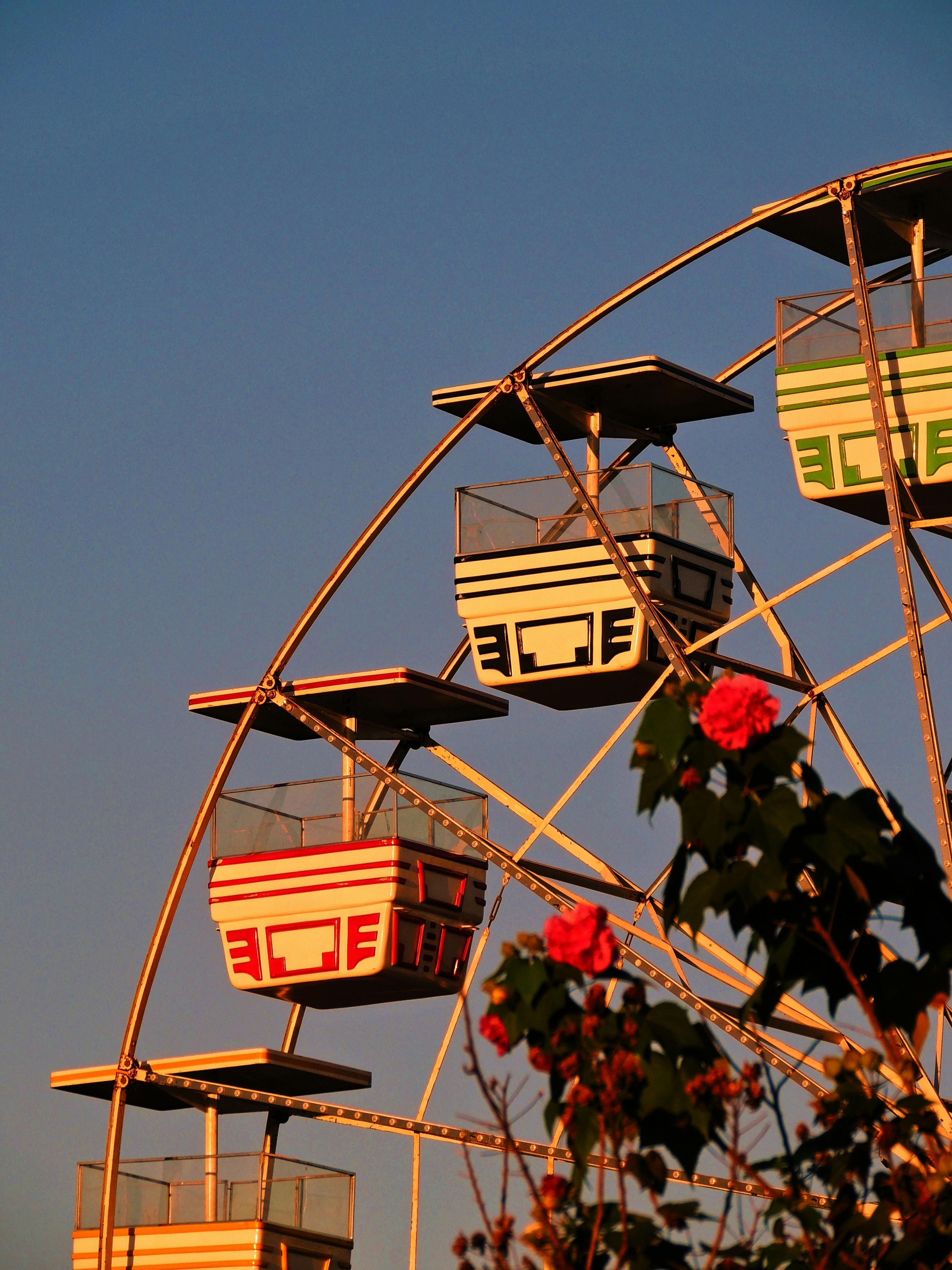 A Carousel under the Clear Blue Sky · Free Stock Photo