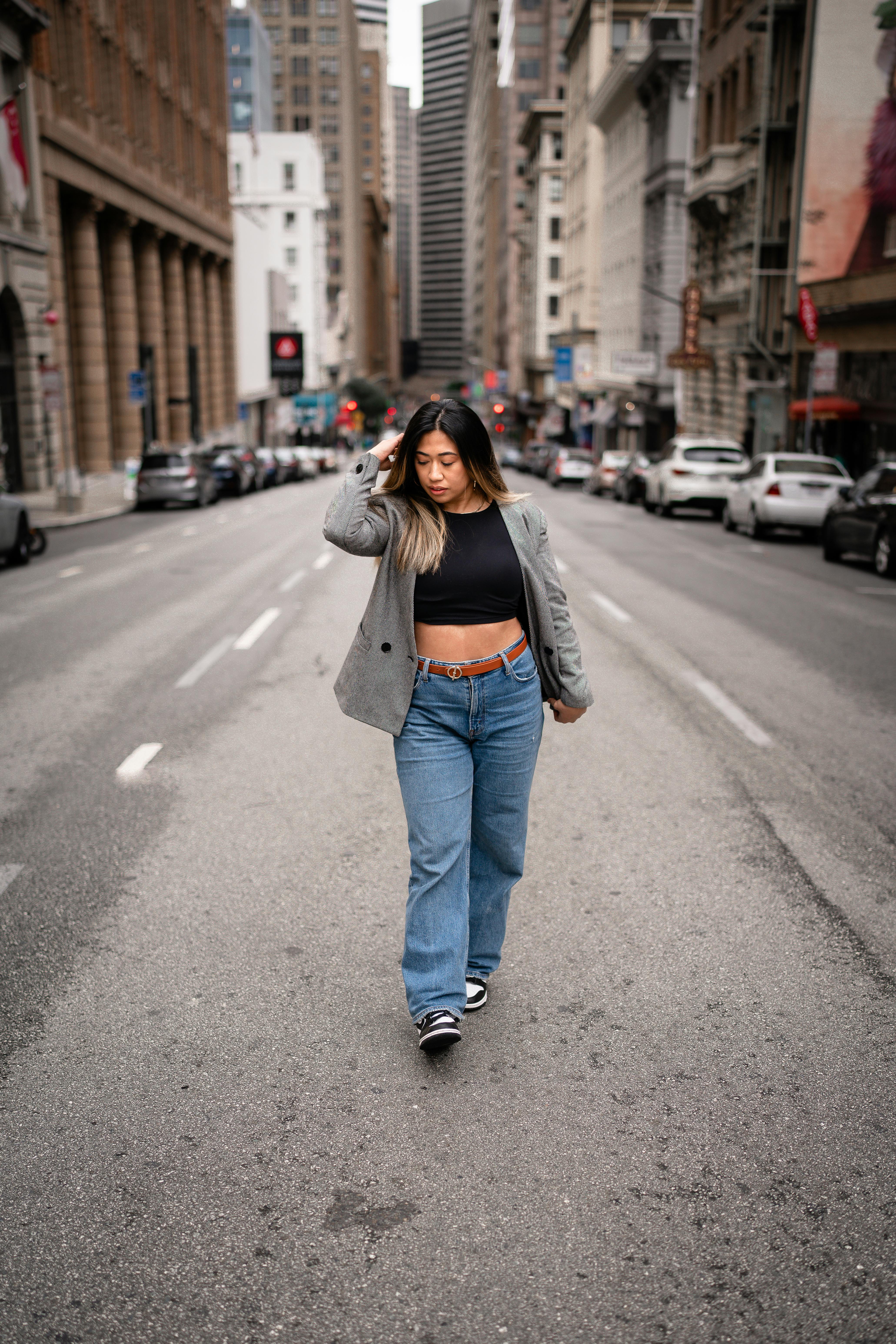 Young Fashionable Woman Posing on the Street in City · Free Stock Photo