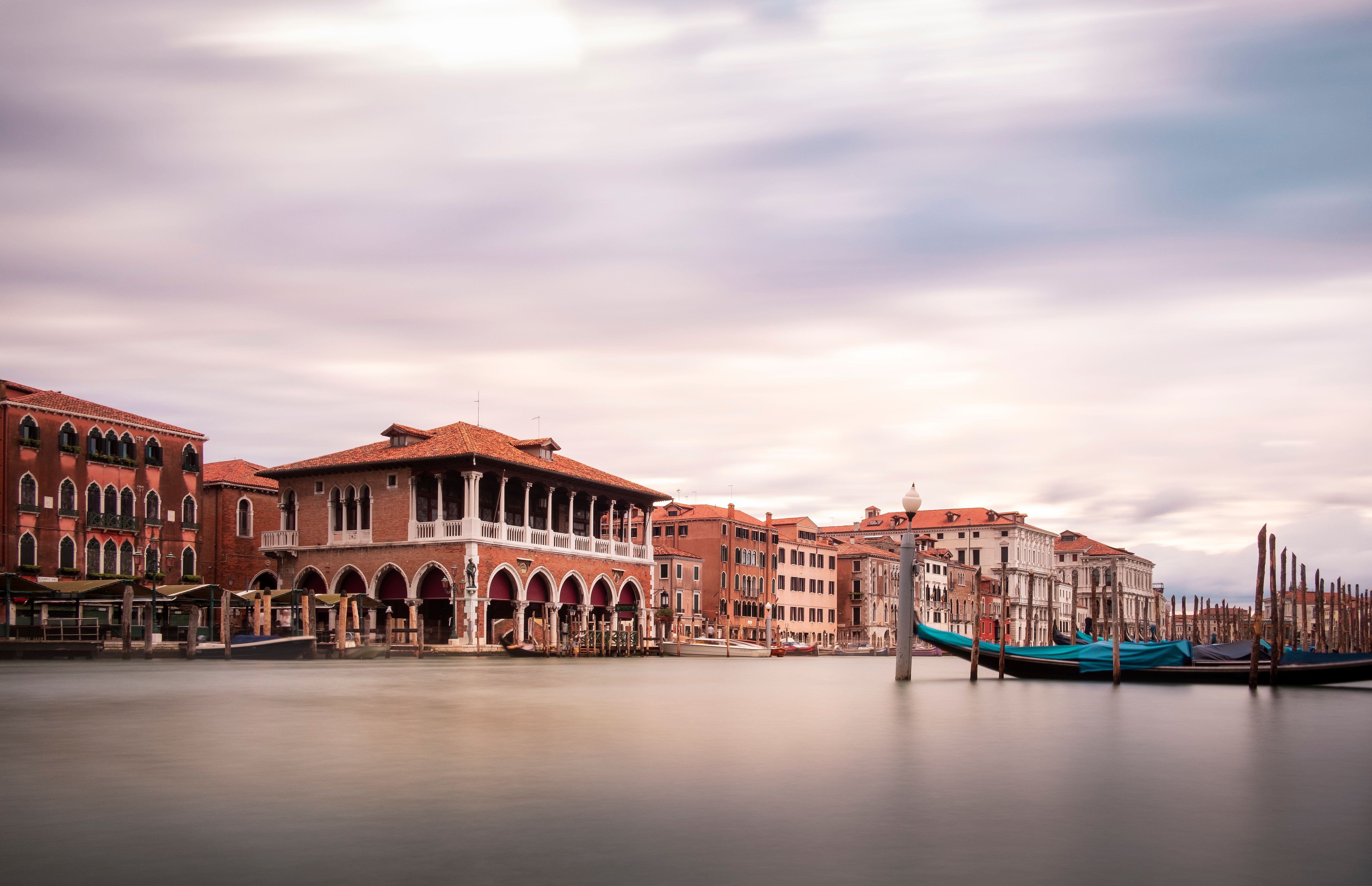 Photo of The Rialto Bridge across the Grand Canal with a Dock · Free ...