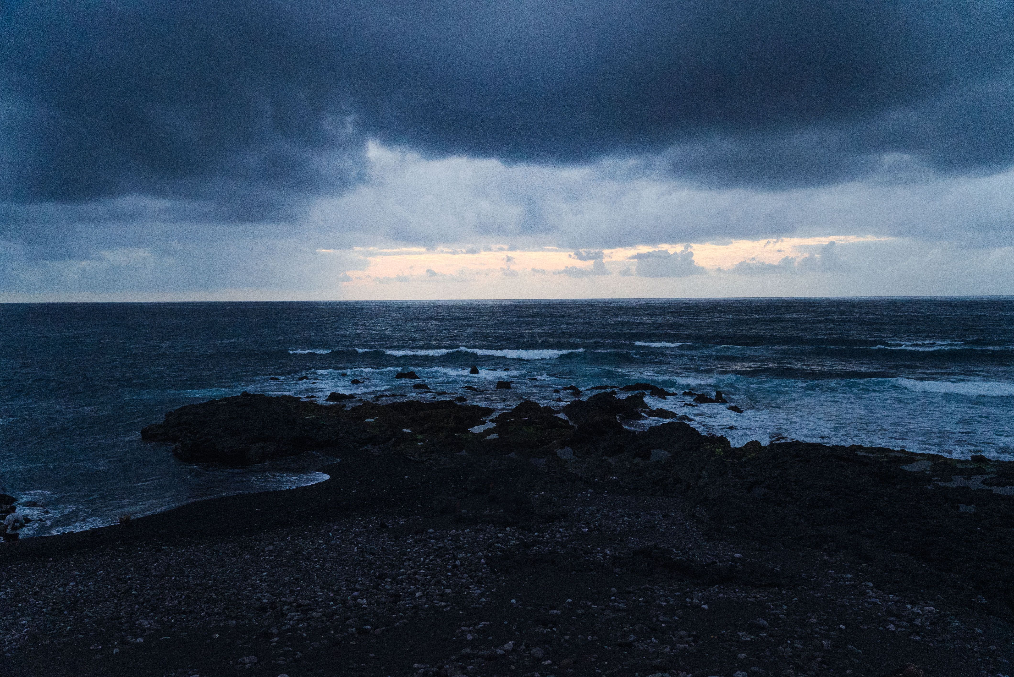 Rain Clouds over Shore · Free Stock Photo
