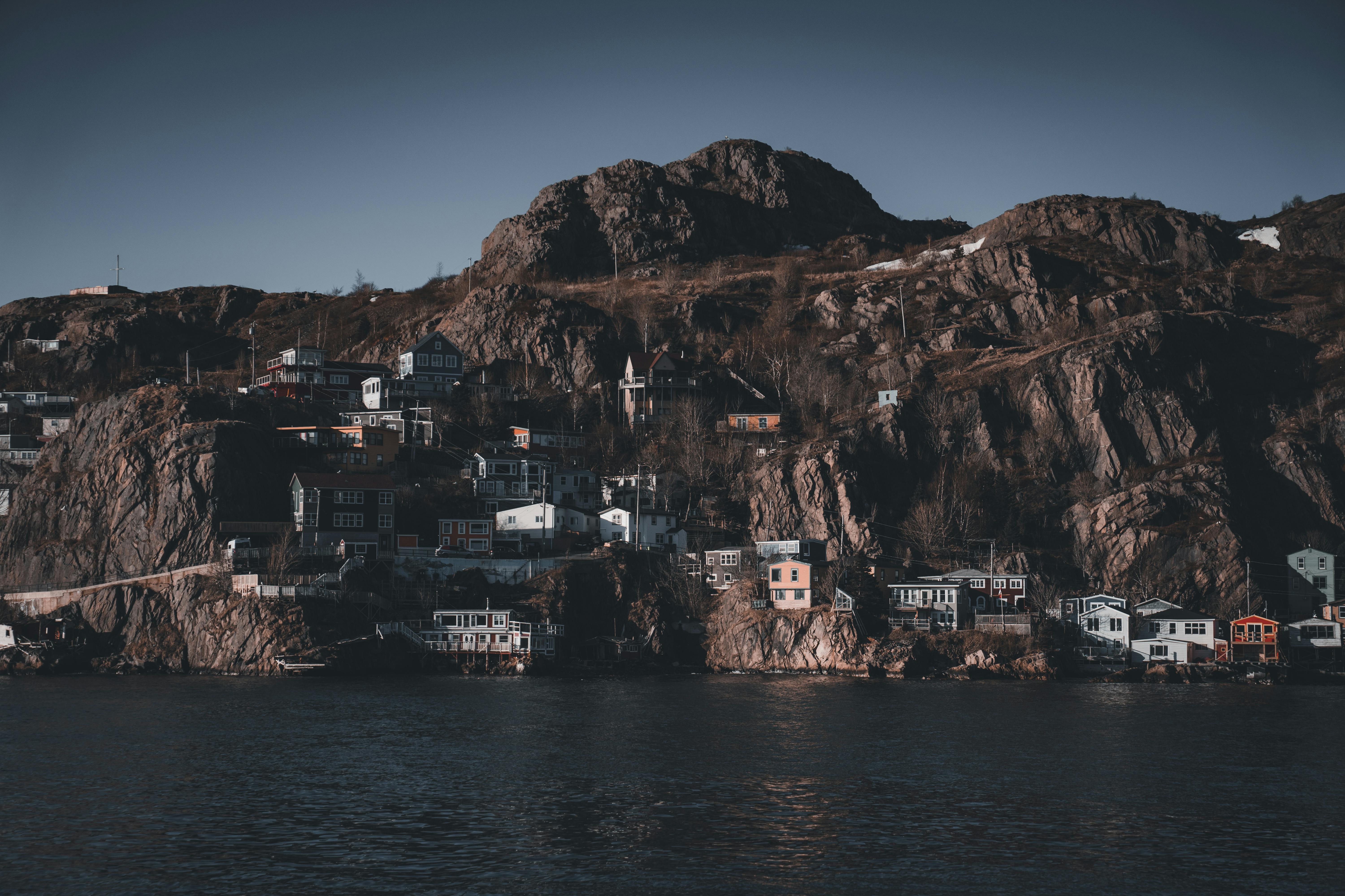 Village on Rocks on Sea Shore · Free Stock Photo