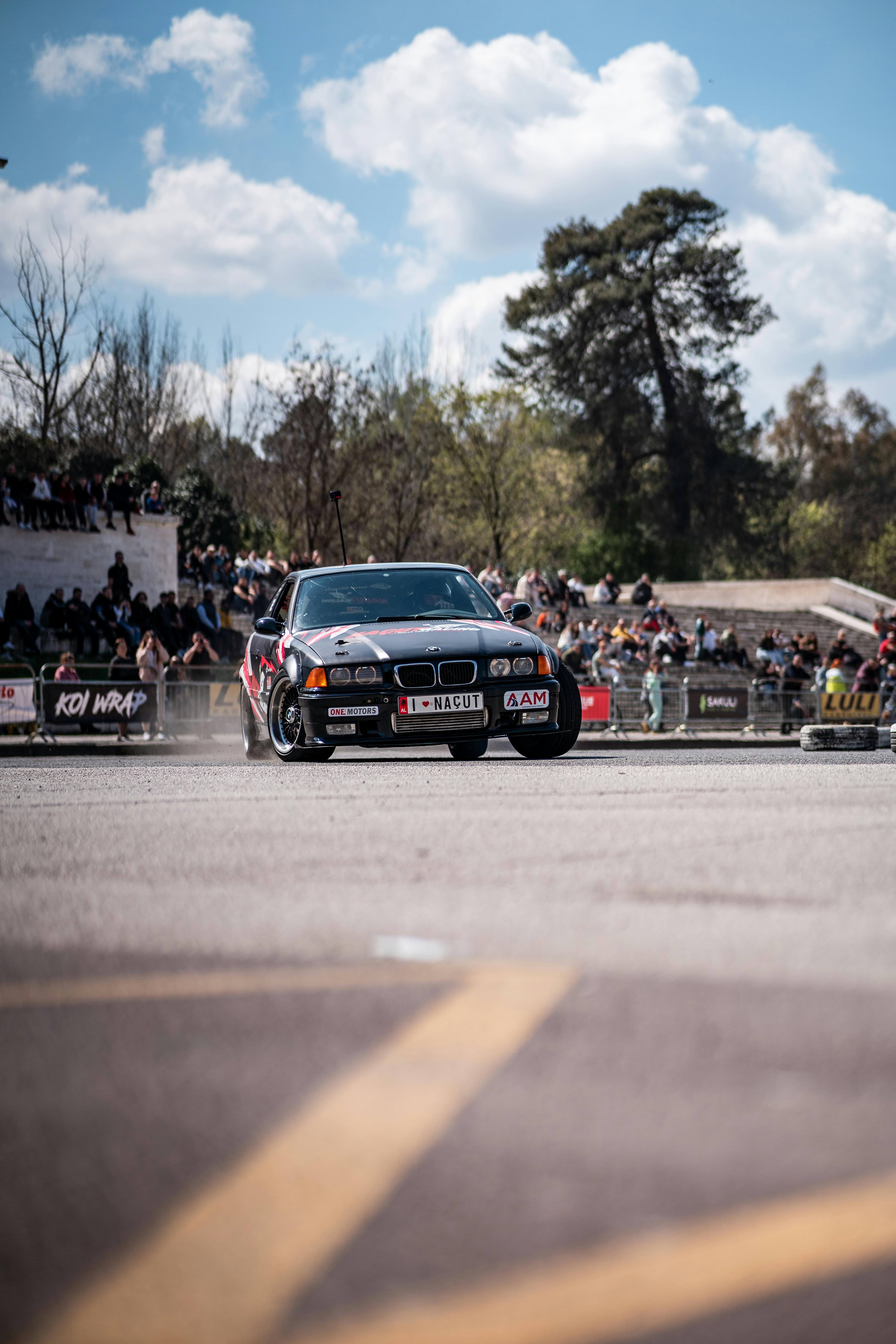 BMW E36 Drifting on the Track at a Car Event · Free Stock Photo