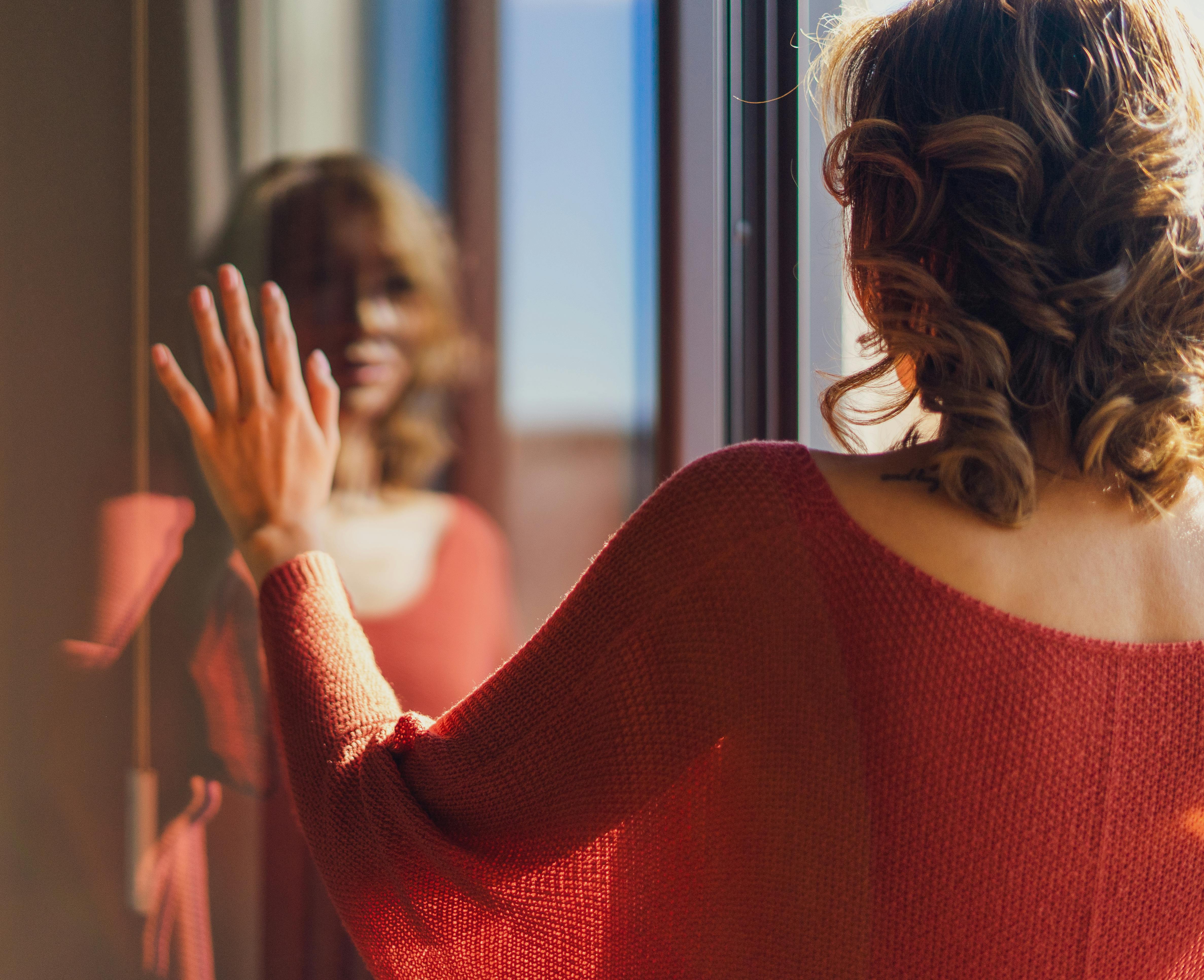 Back View of Woman in Red Clothes and Reflection in Mirror · Free Stock ...