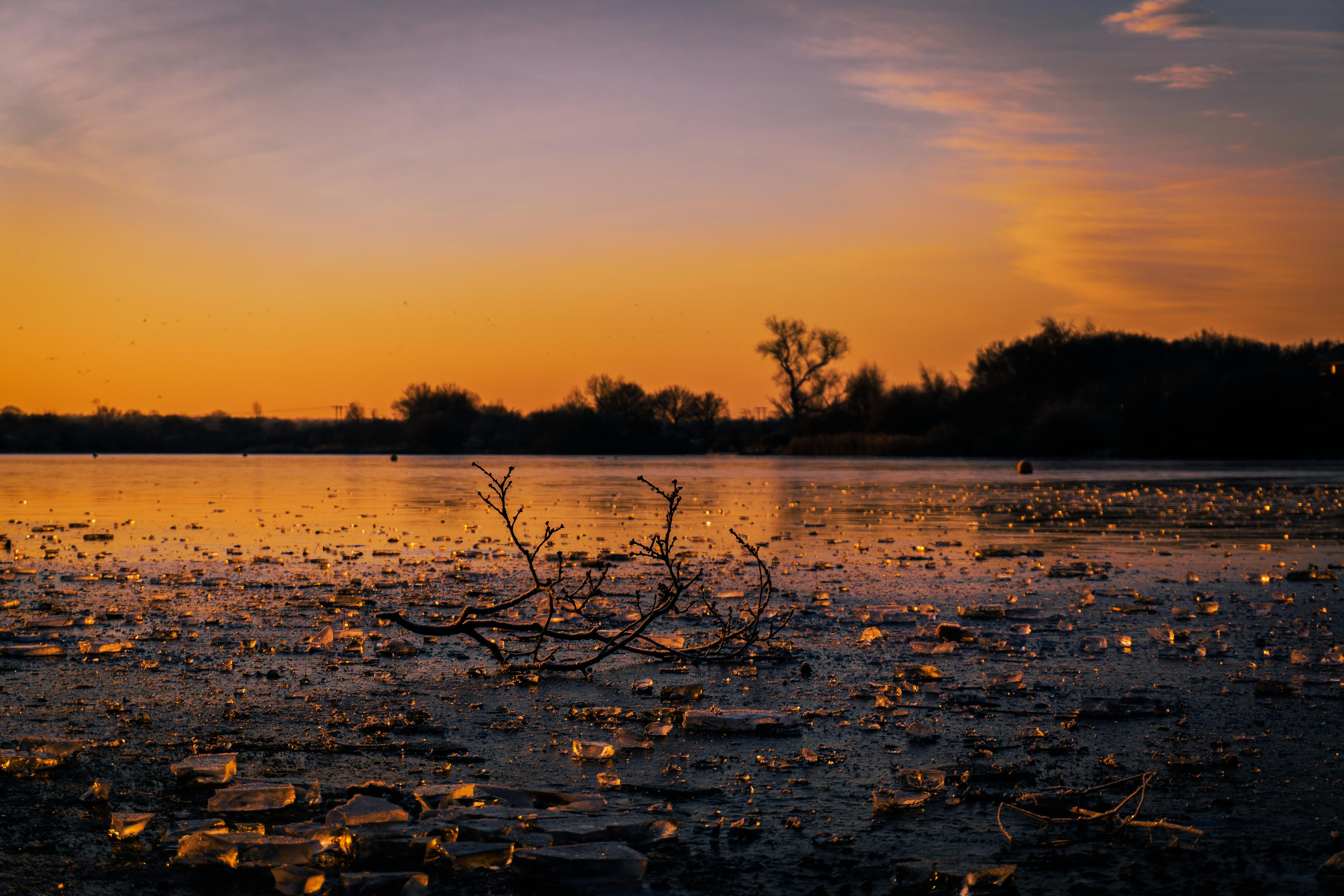 A Frozen Lake at Sunset · Free Stock Photo