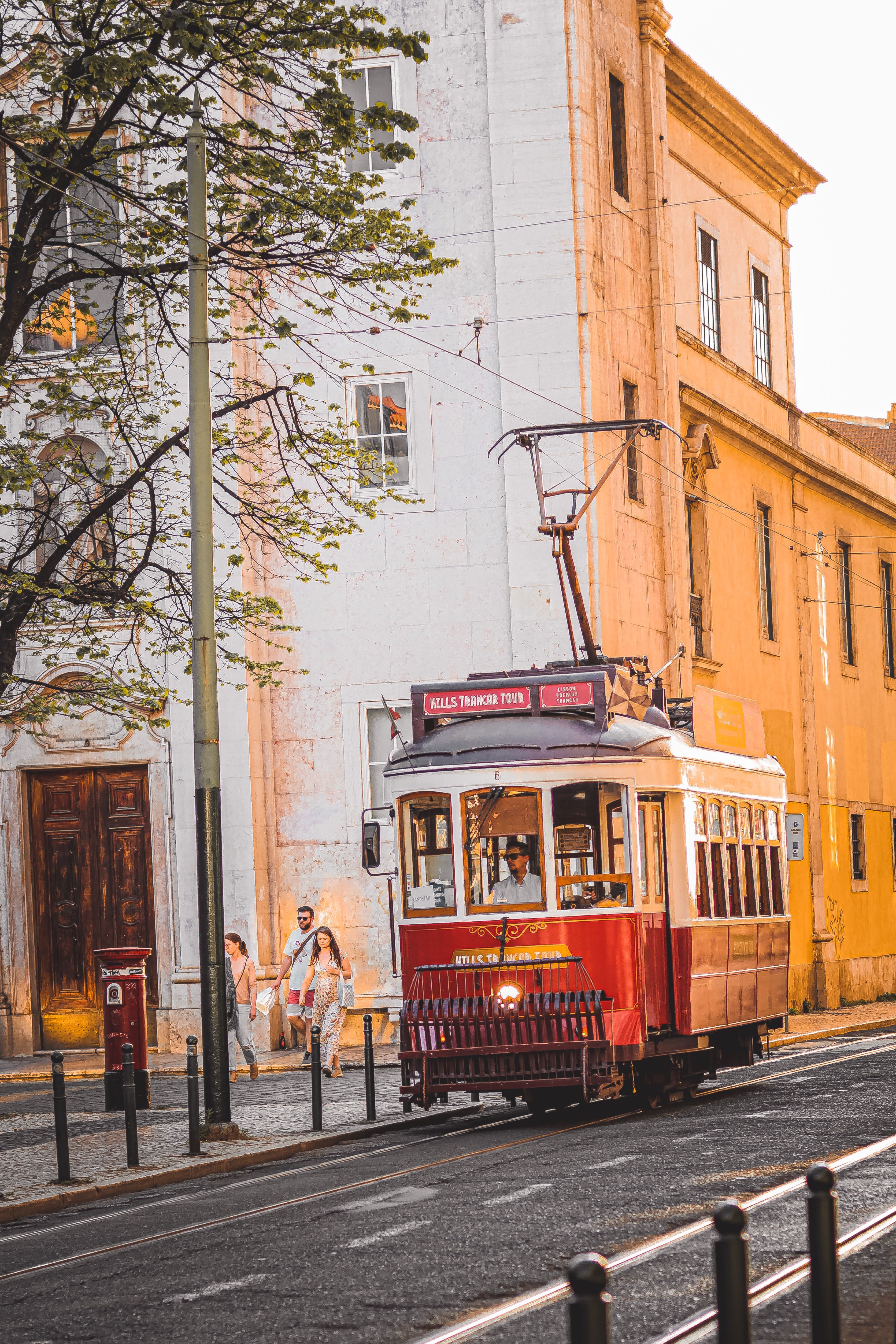 Vintage Tram on Street in Town · Free Stock Photo