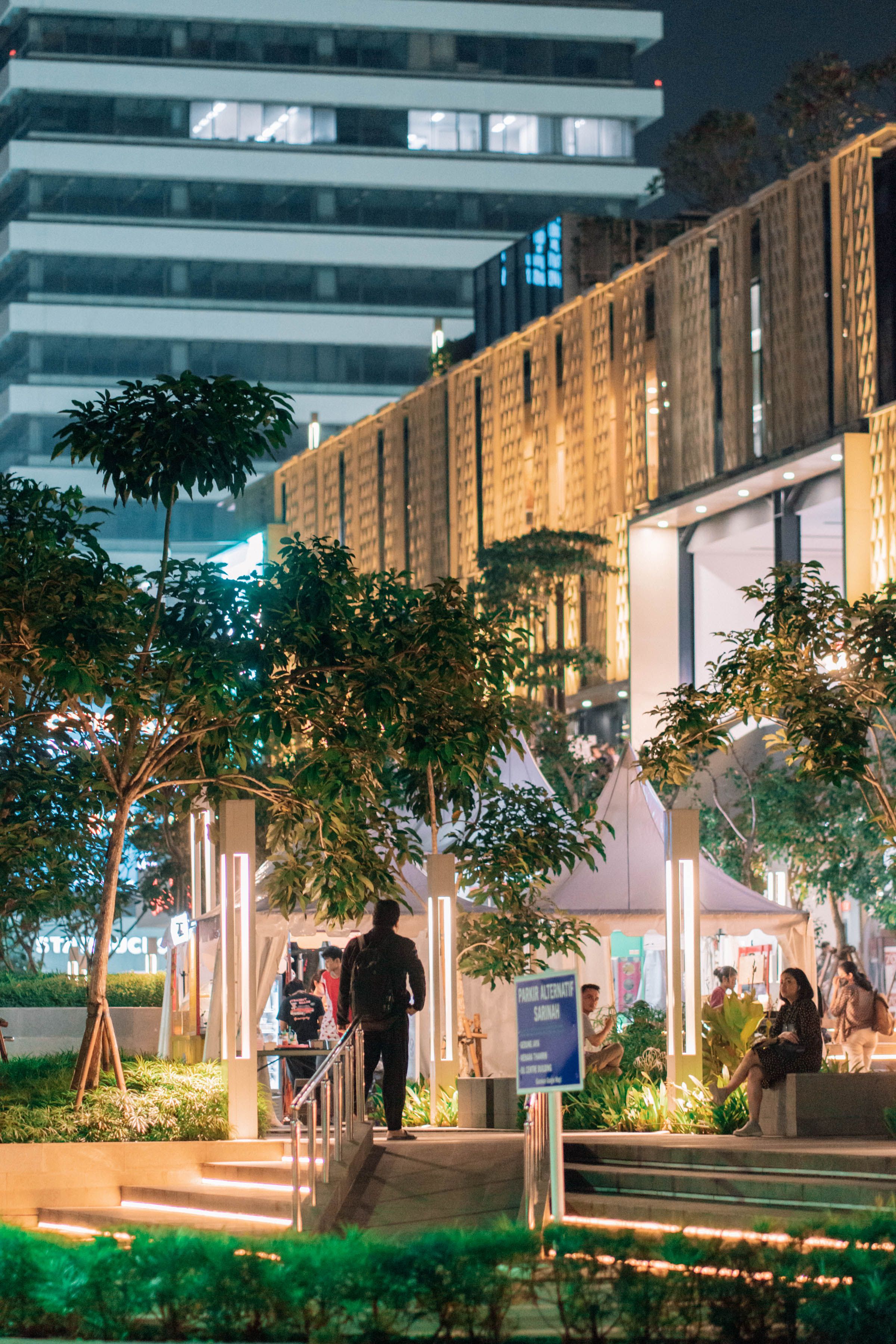 A Green Park between Modern Buildings in City · Free Stock Photo