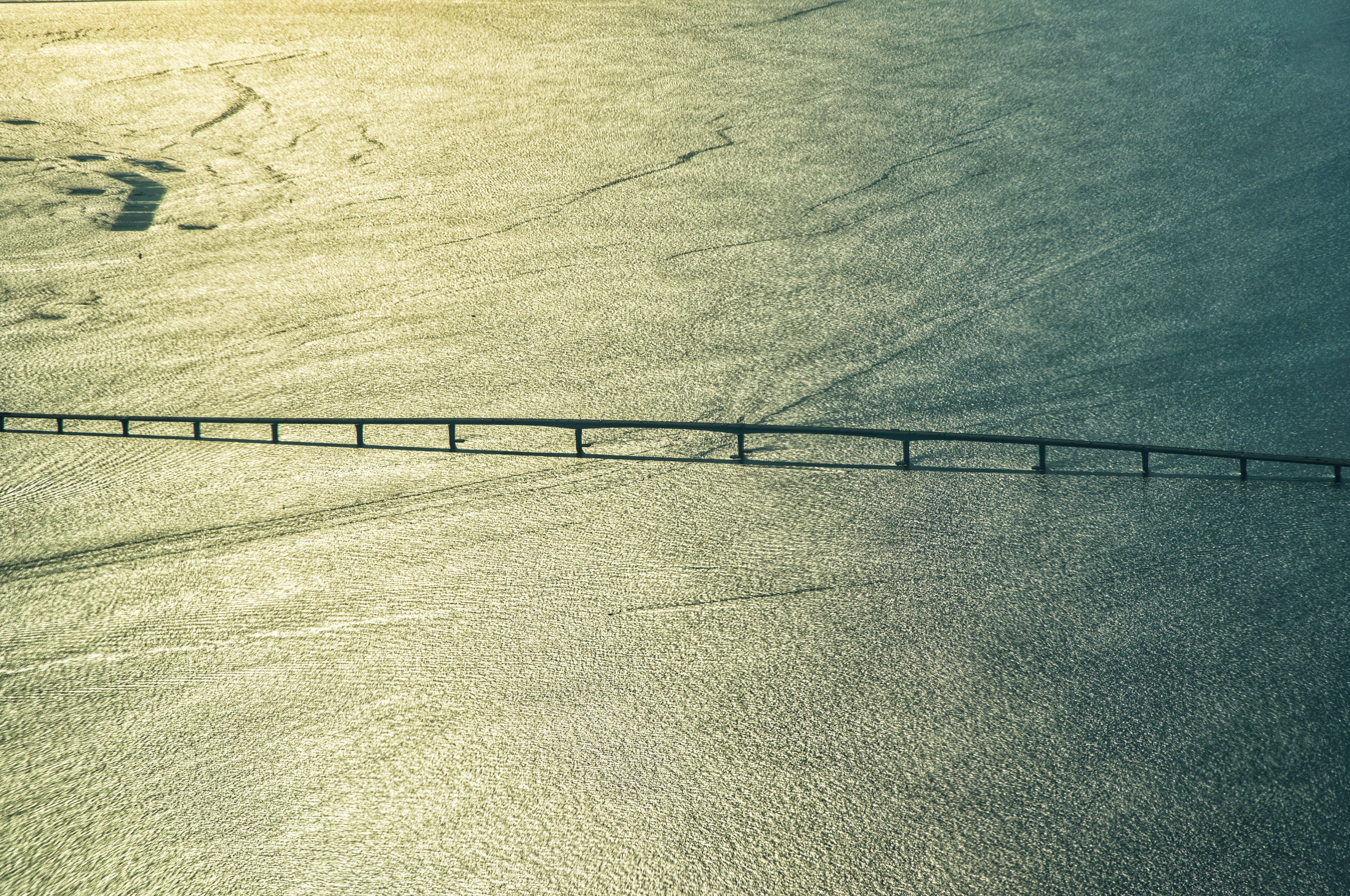 Aerial View of a Long Bridge through a Bay · Free Stock Photo