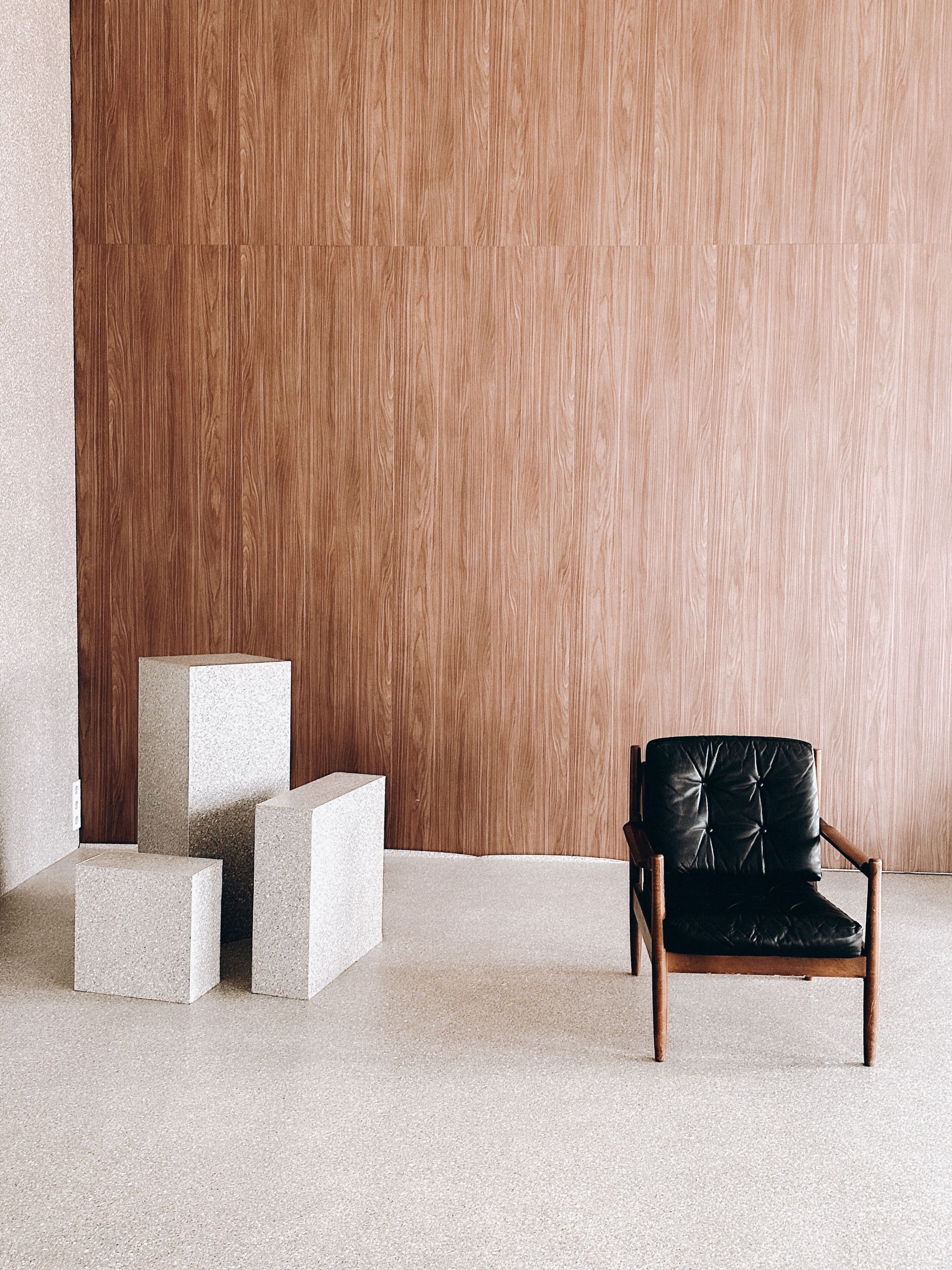 Black Chair and White Boxes in a Room · Free Stock Photo