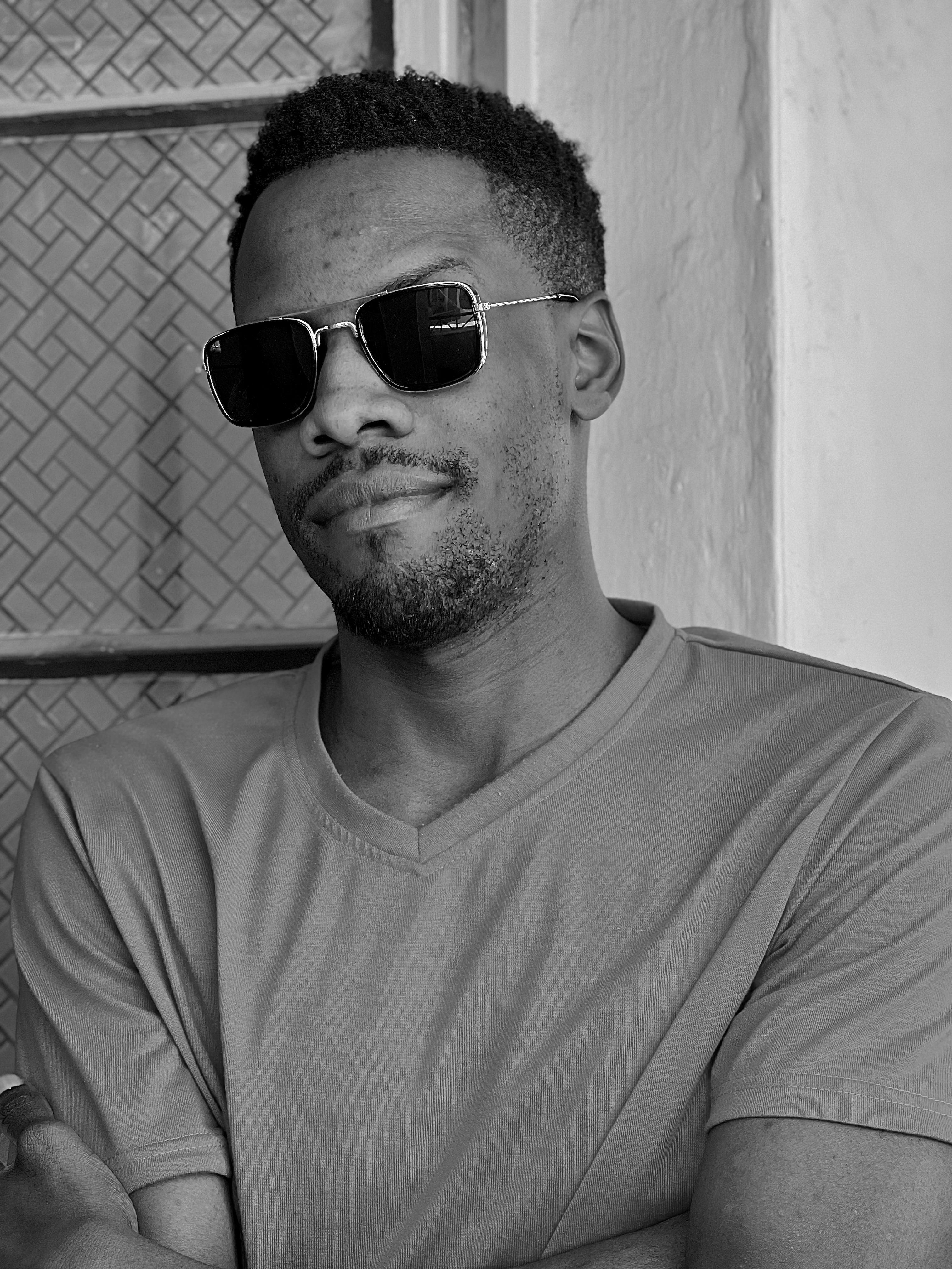 Portrait of an African Man in Traditional Outfit in Black and White ...