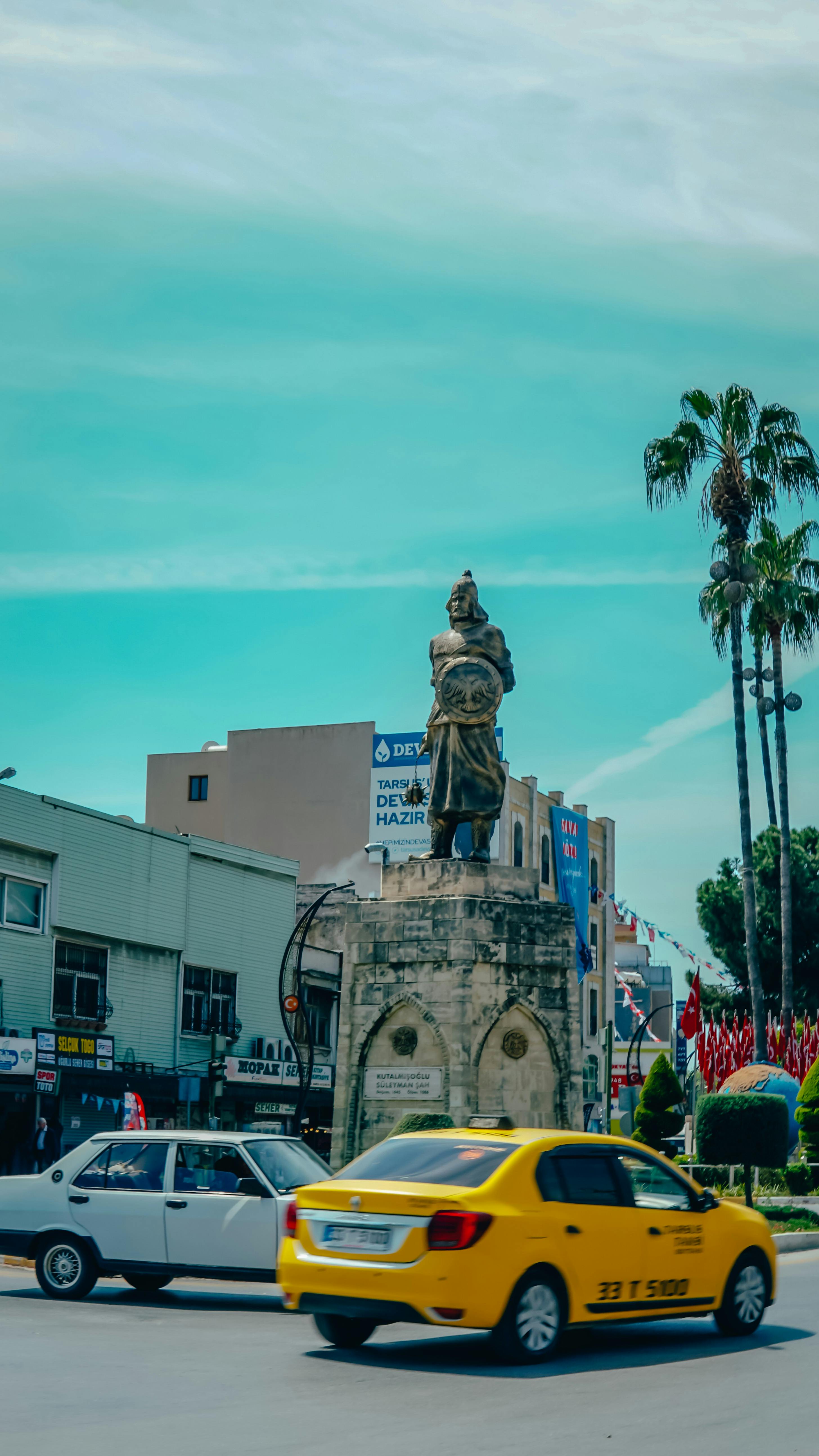 Different Flags Waving on Poles at Daytime · Free Stock Photo