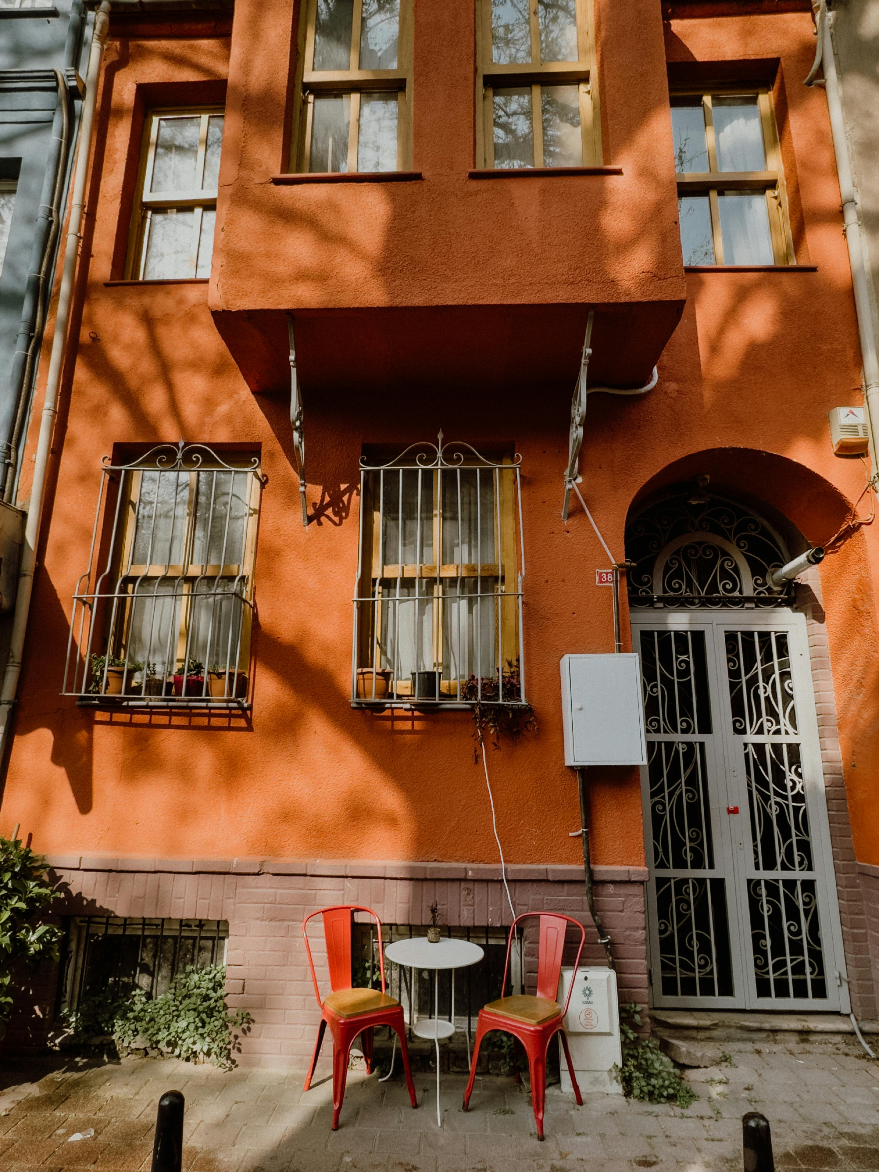 Facade of an Orange Residential Building in City · Free Stock Photo
