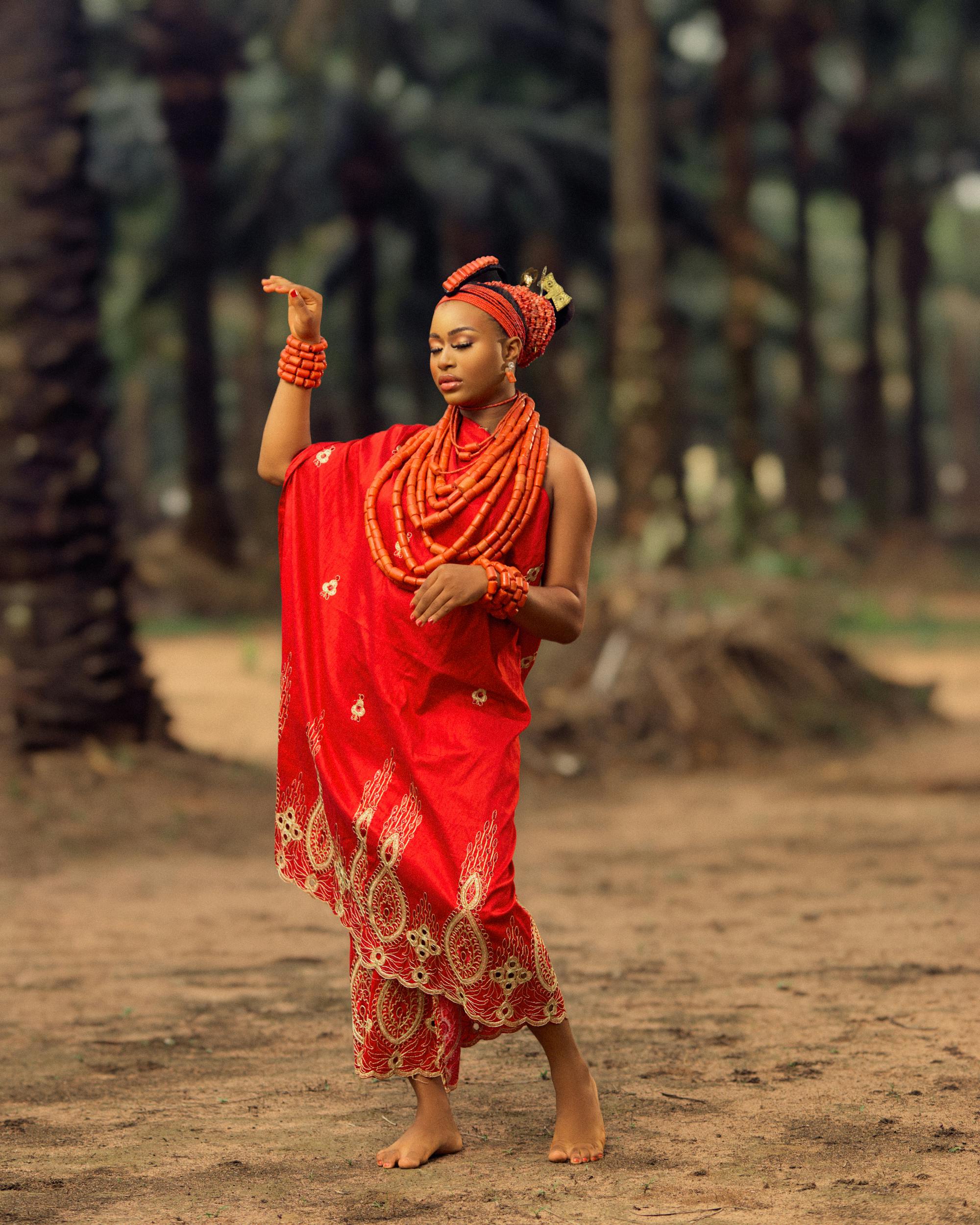 Beautiful Woman in Tribal Red Clothing · Free Stock Photo