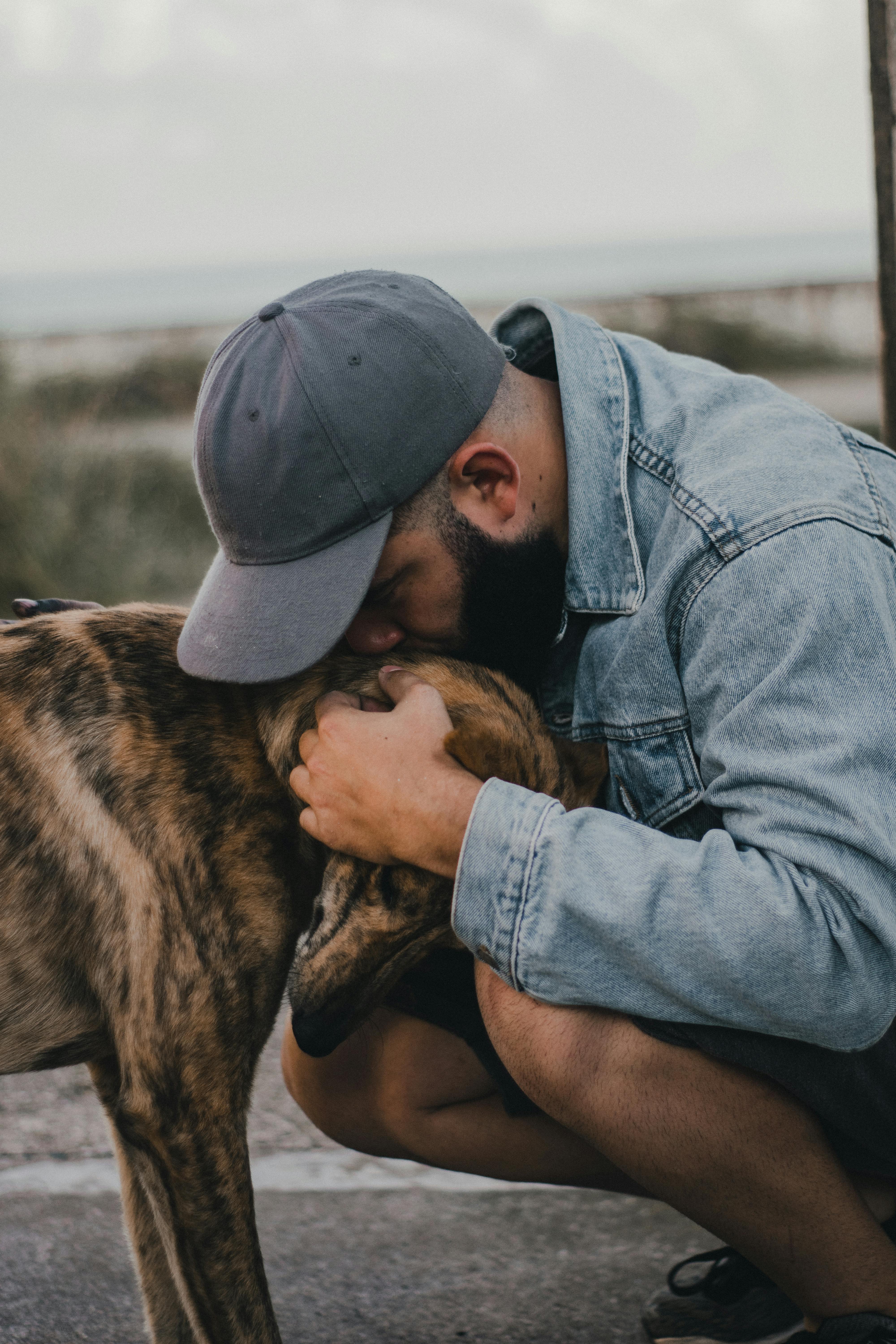 Man Kissing Dog · Free Stock Photo