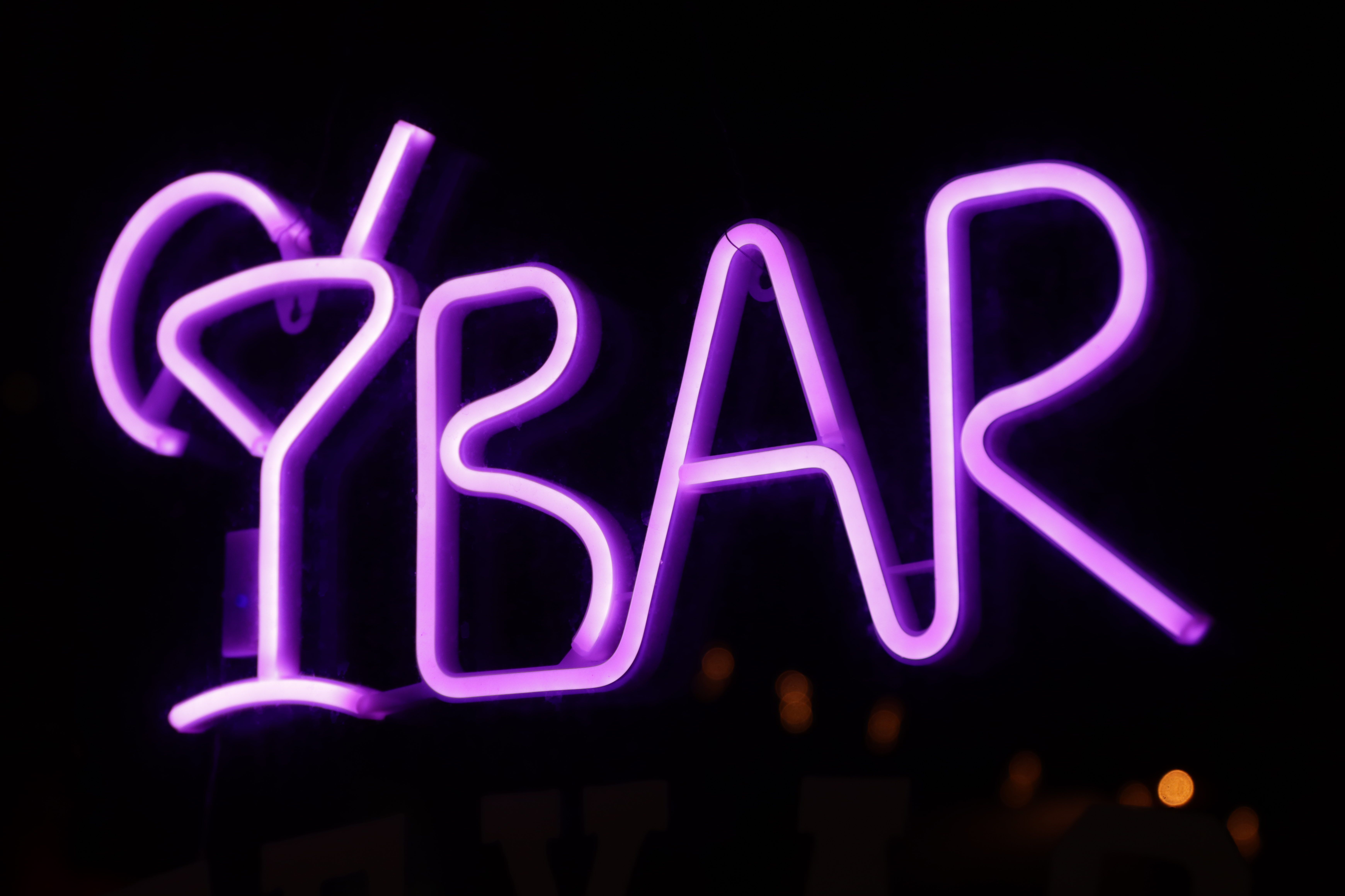 Close-up of a Purple Neon Sign of a Bar · Free Stock Photo