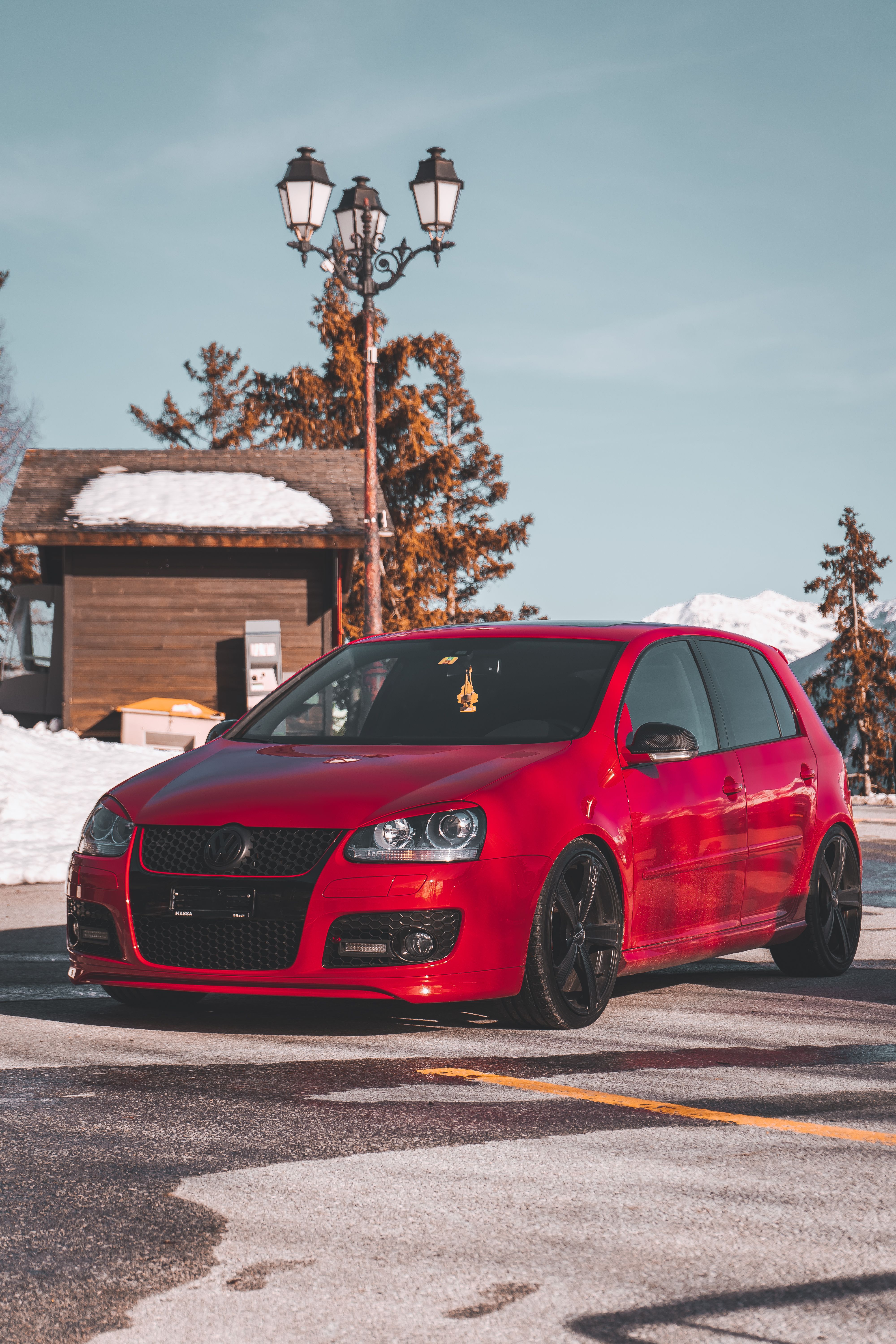 Red Car on a Road in Winter · Free Stock Photo