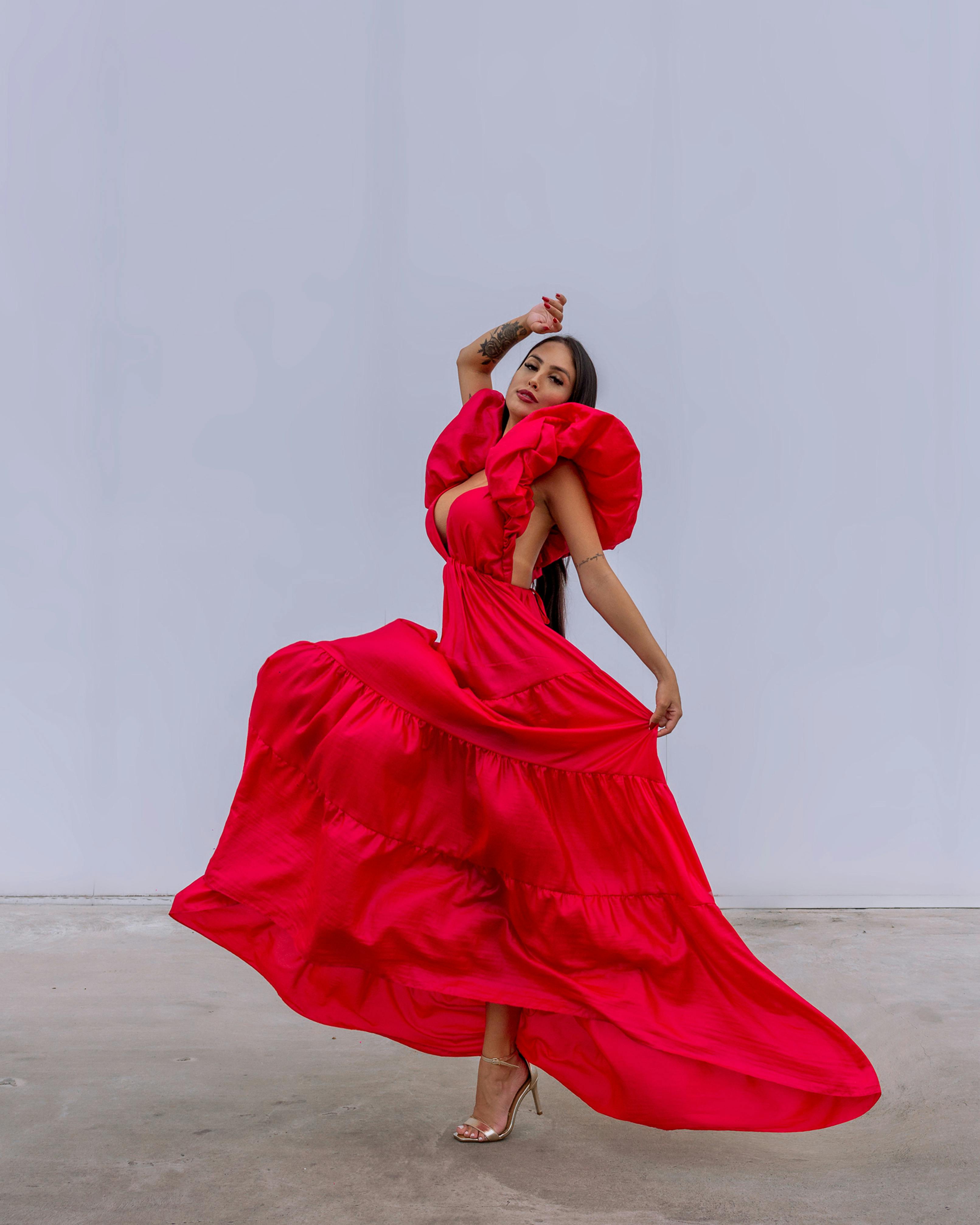Dancing Woman in Red Evening Dress · Free Stock Photo
