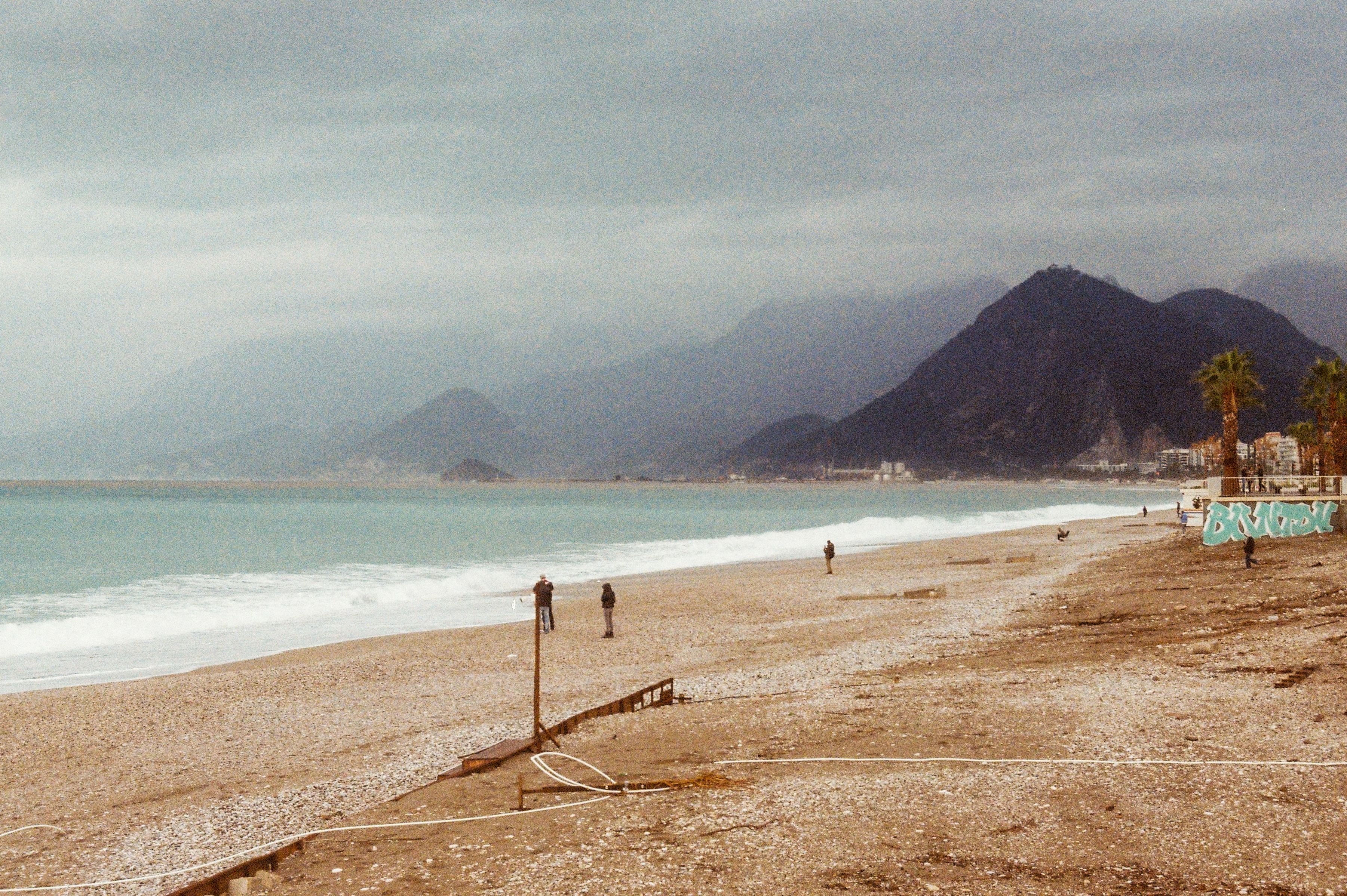 People on Beach during Storm · Free Stock Photo
