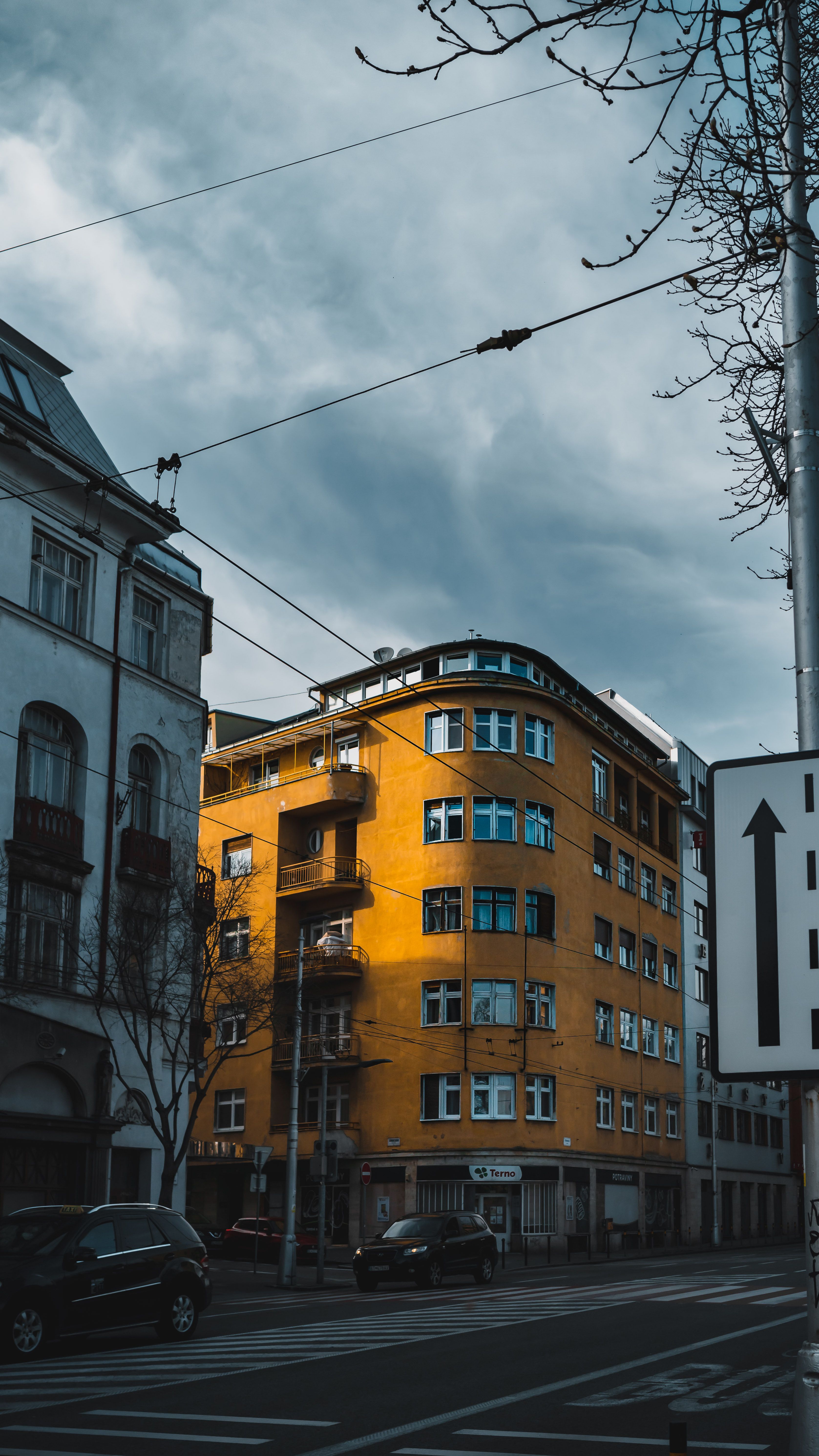 Benches in front of Prefab Building on a City Street · Free Stock Photo