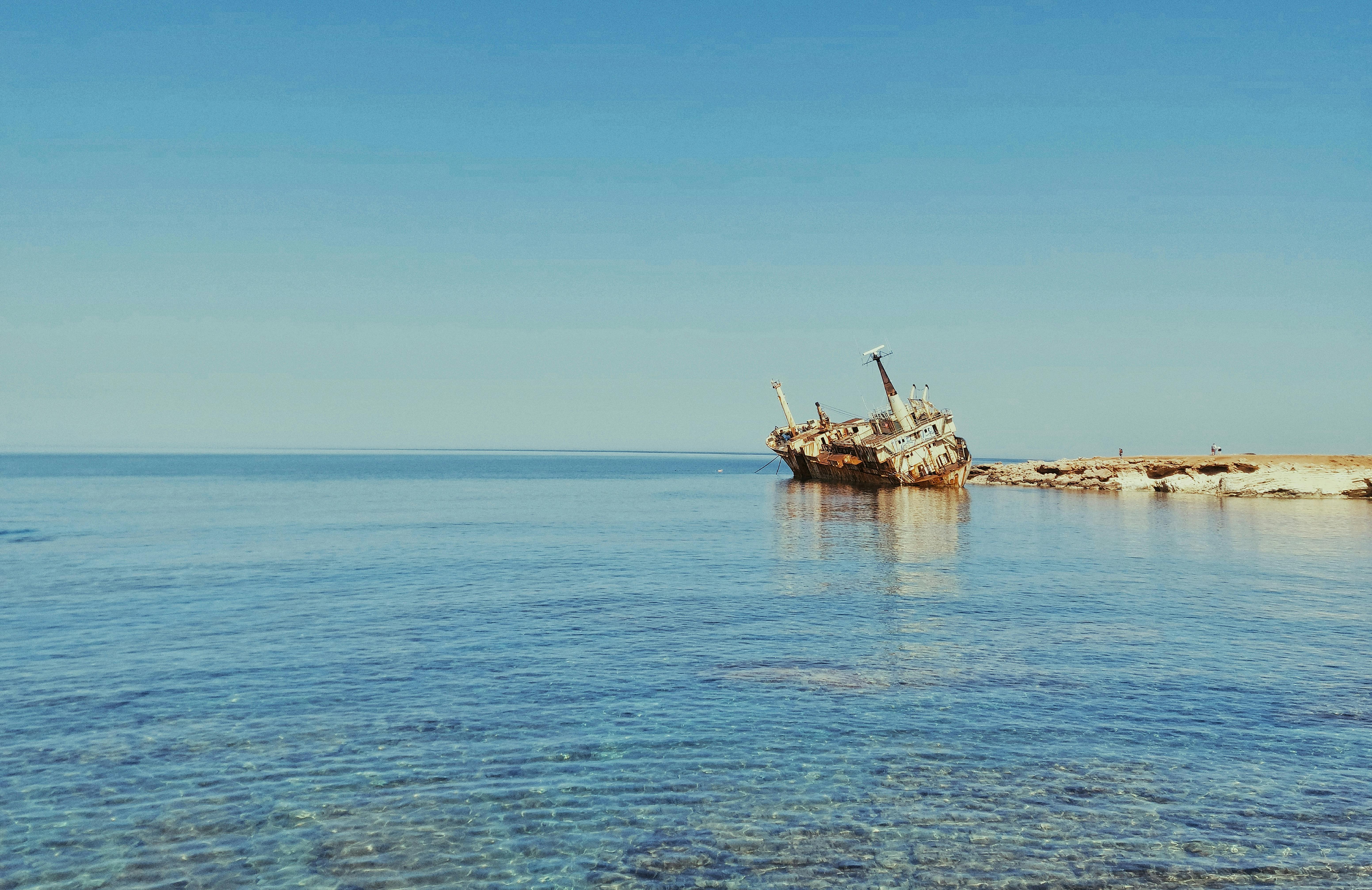 Wreck of Ship in Sea · Free Stock Photo