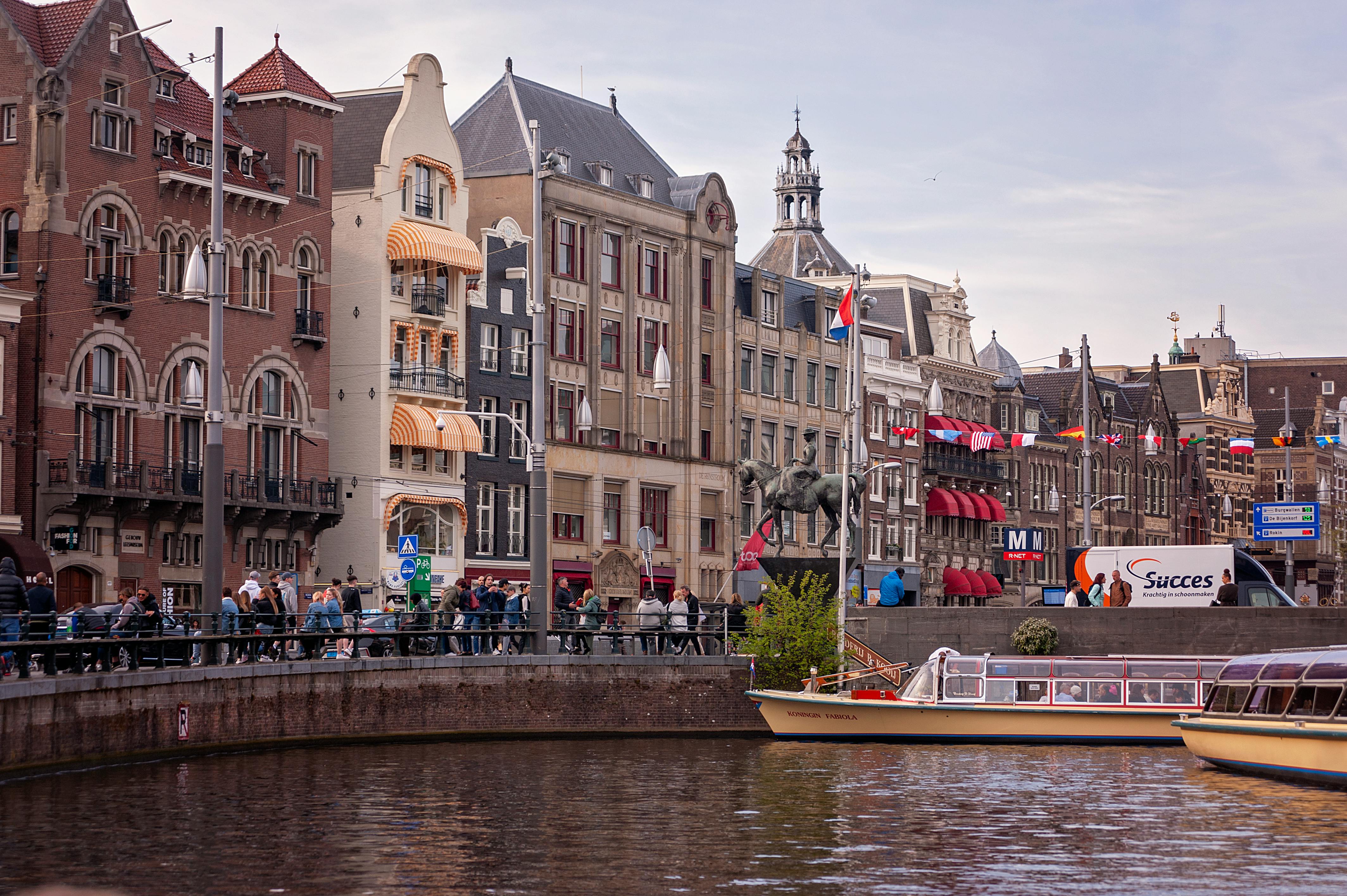 Colorful Facade of Amsterdam Waterfront Houses · Free Stock Photo