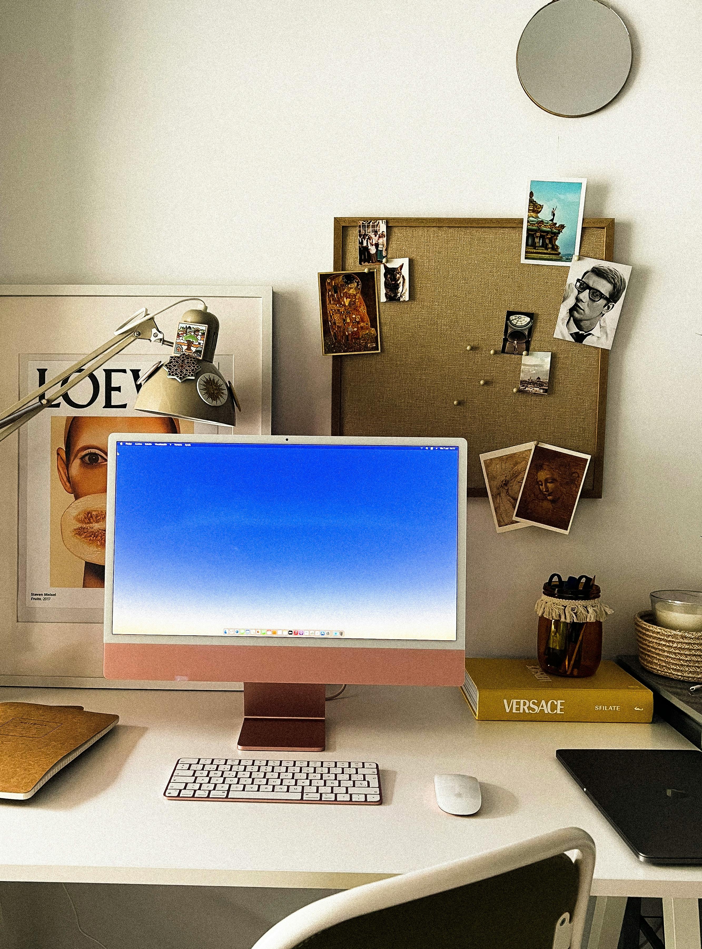 Netbook and computer placed on desk in office · Free Stock Photo