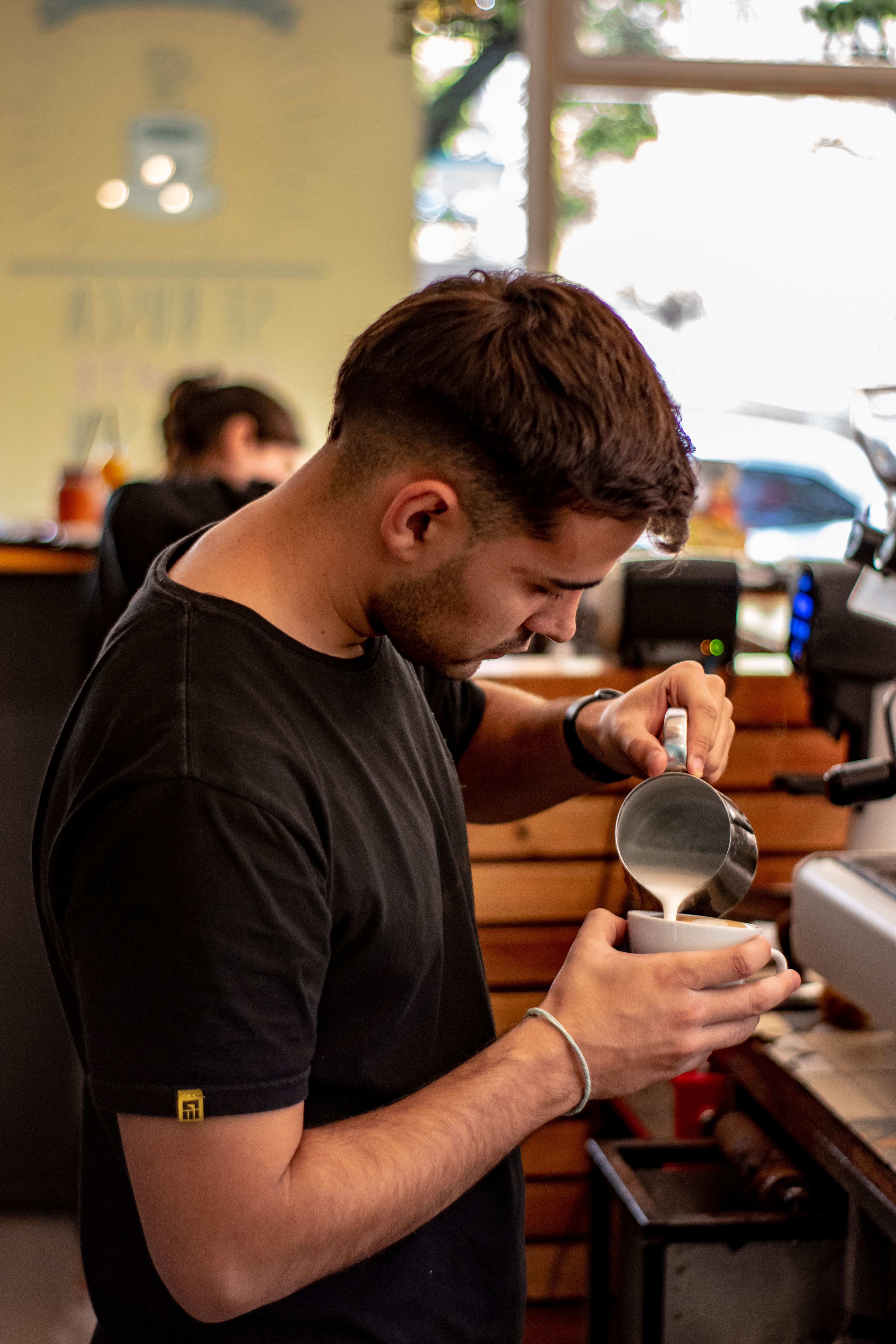 Man Preparing Coffee in a Restaurant · Free Stock Photo