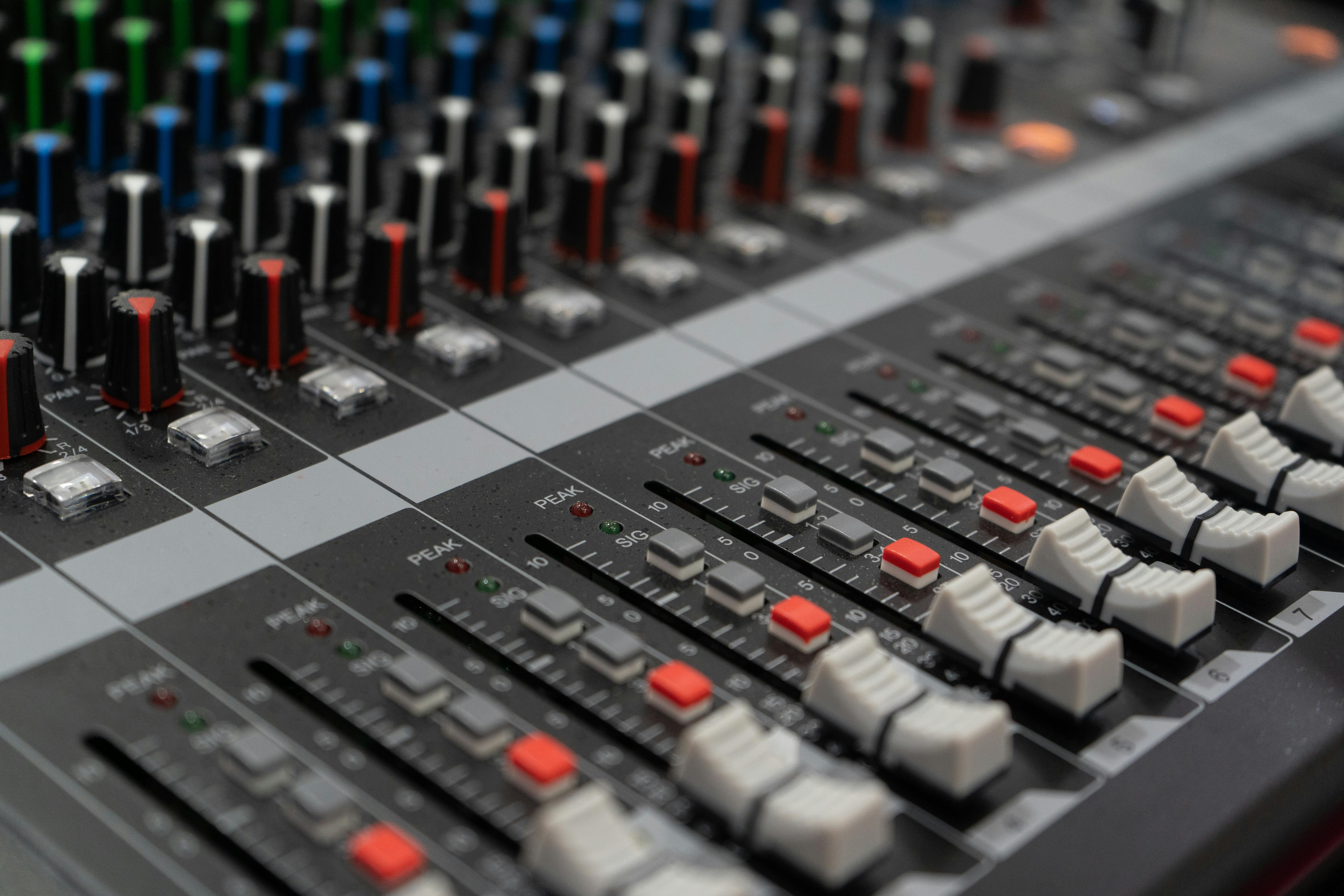 Rows of Dials on a Professional Sound Mixer · Free Stock Photo