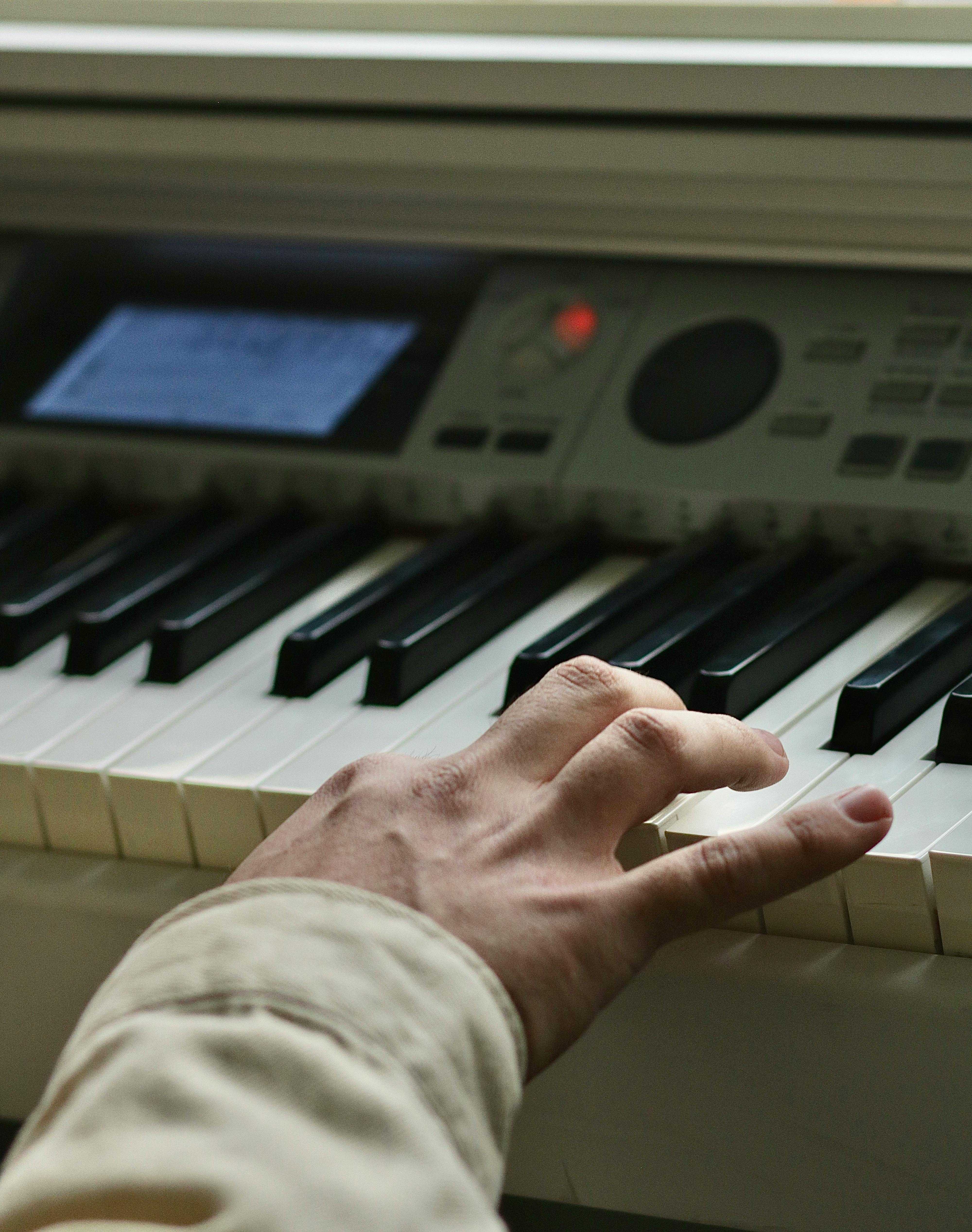 Man Hand on Keyboard · Free Stock Photo