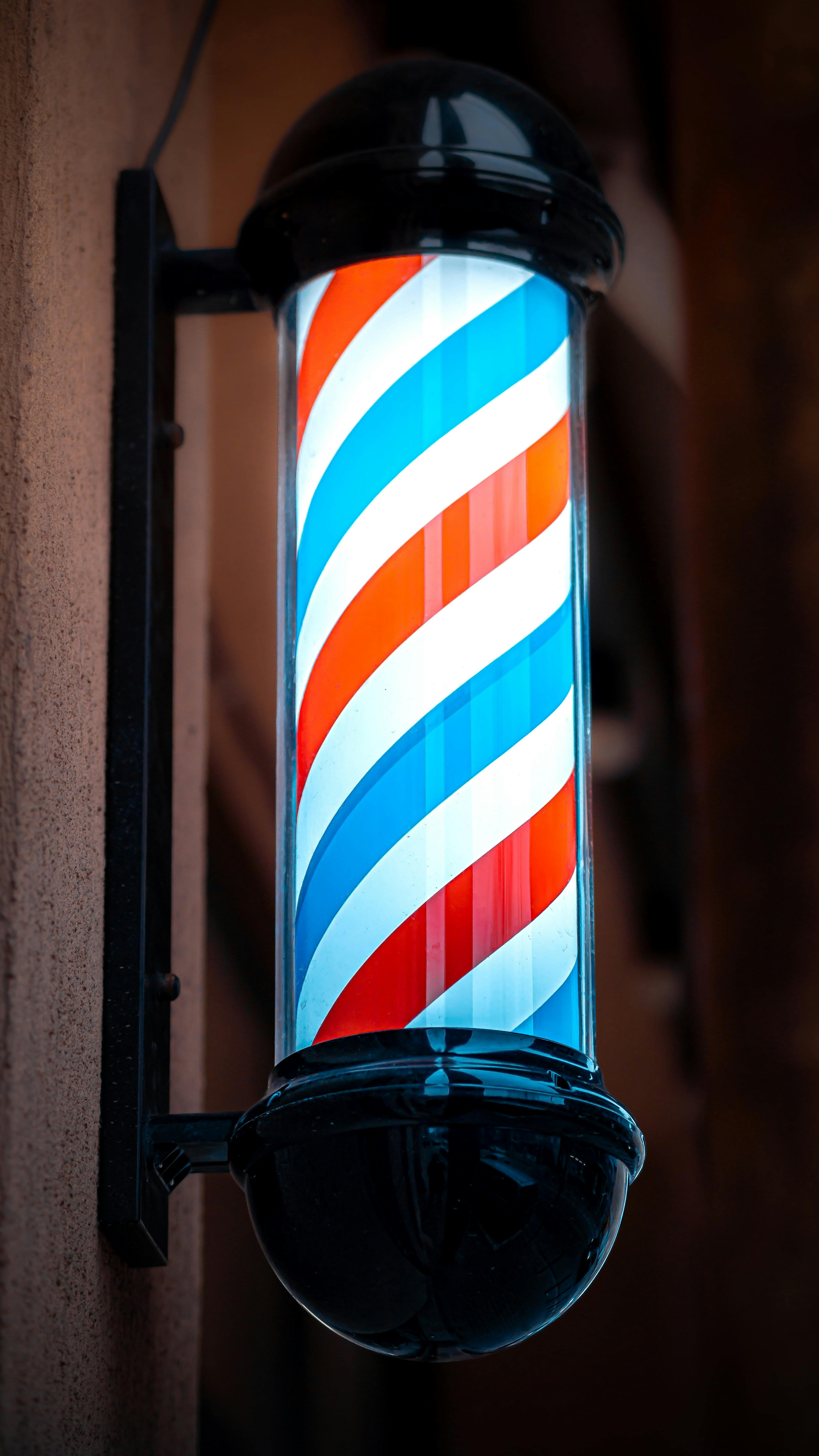 Close-up of a Light Outside of a Barber Shop · Free Stock Photo